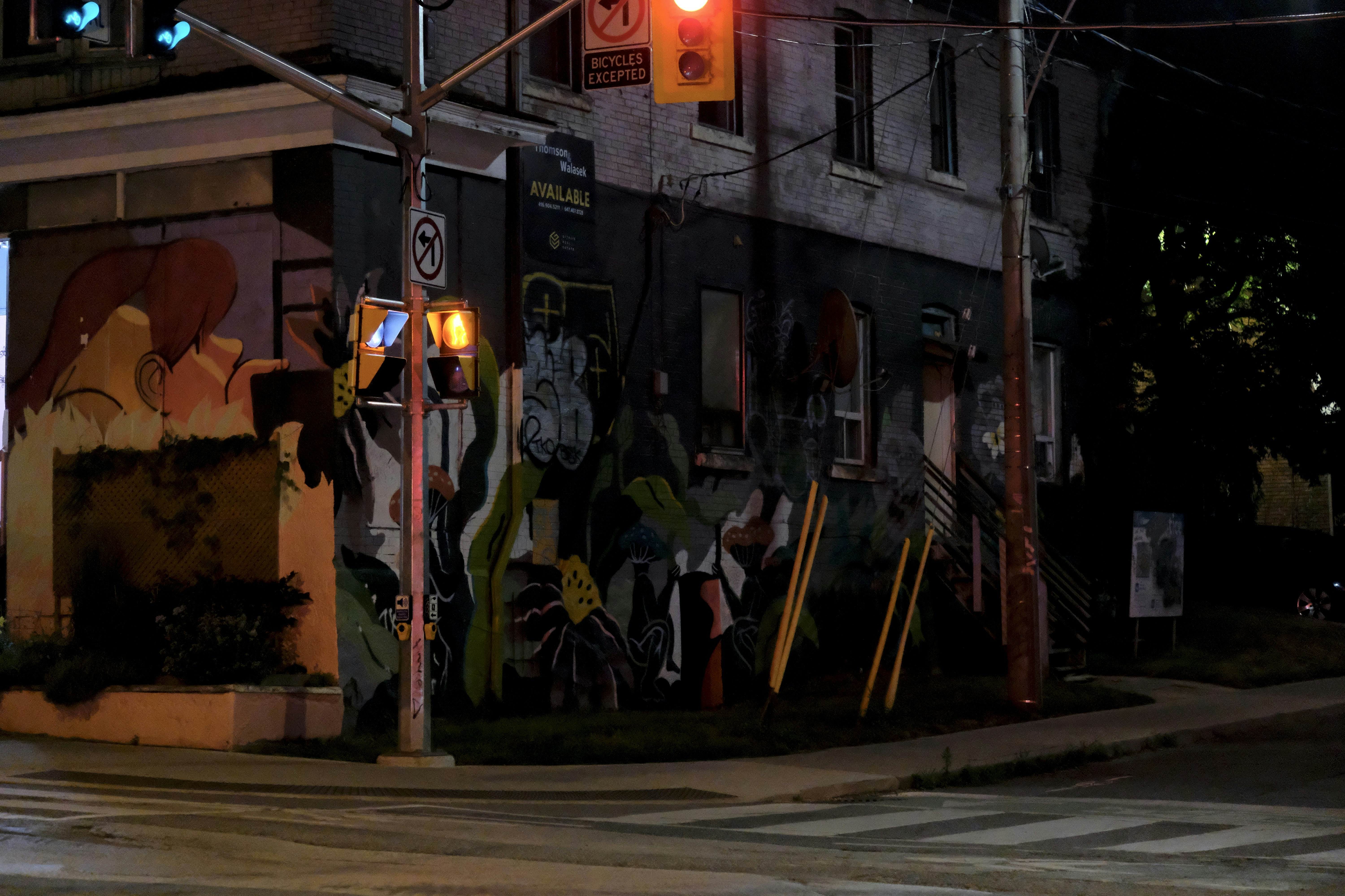 Neon Graffiti Corner Under Quiet Streetlight