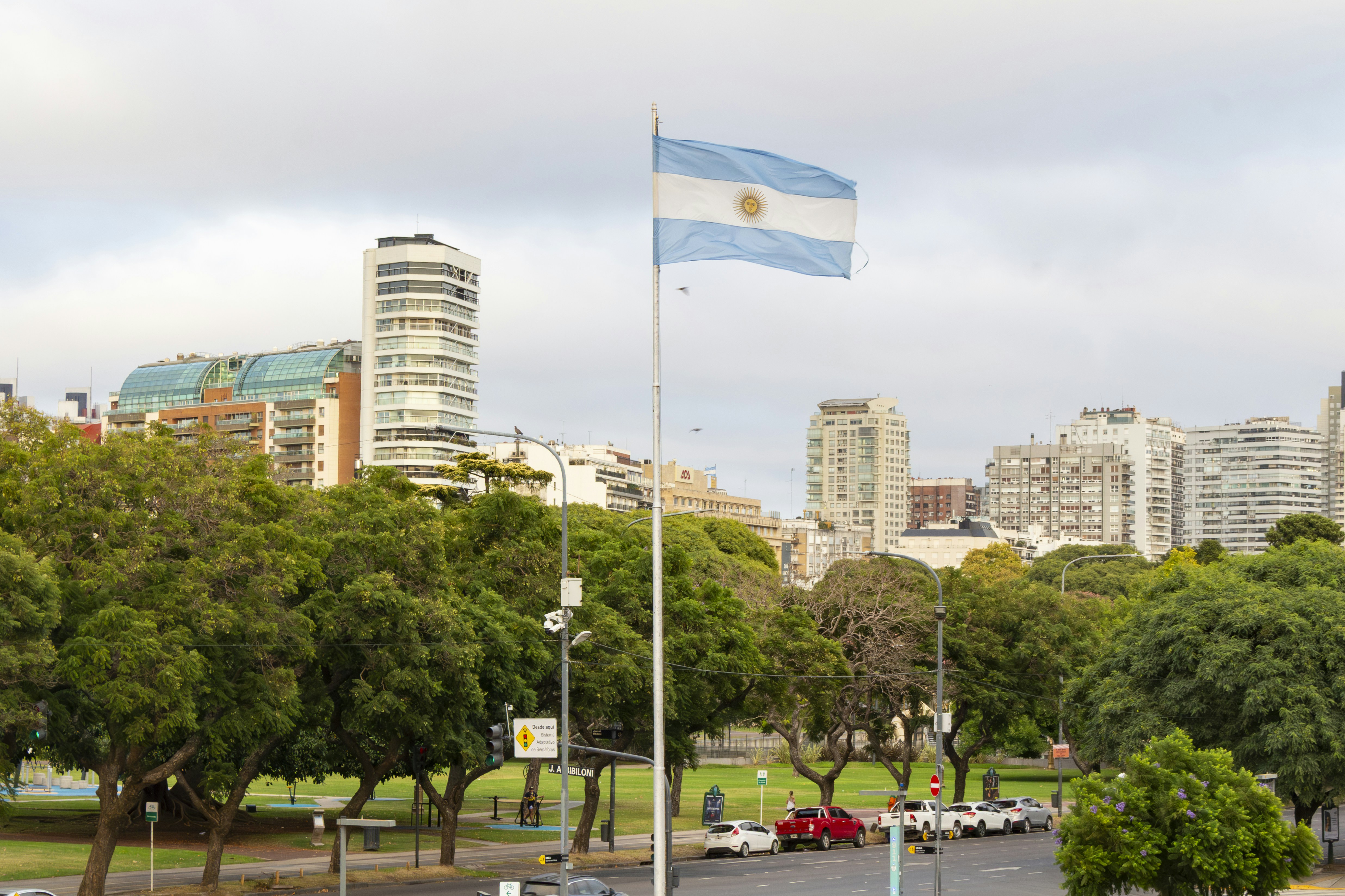 Flagpole Overlooking a City Park