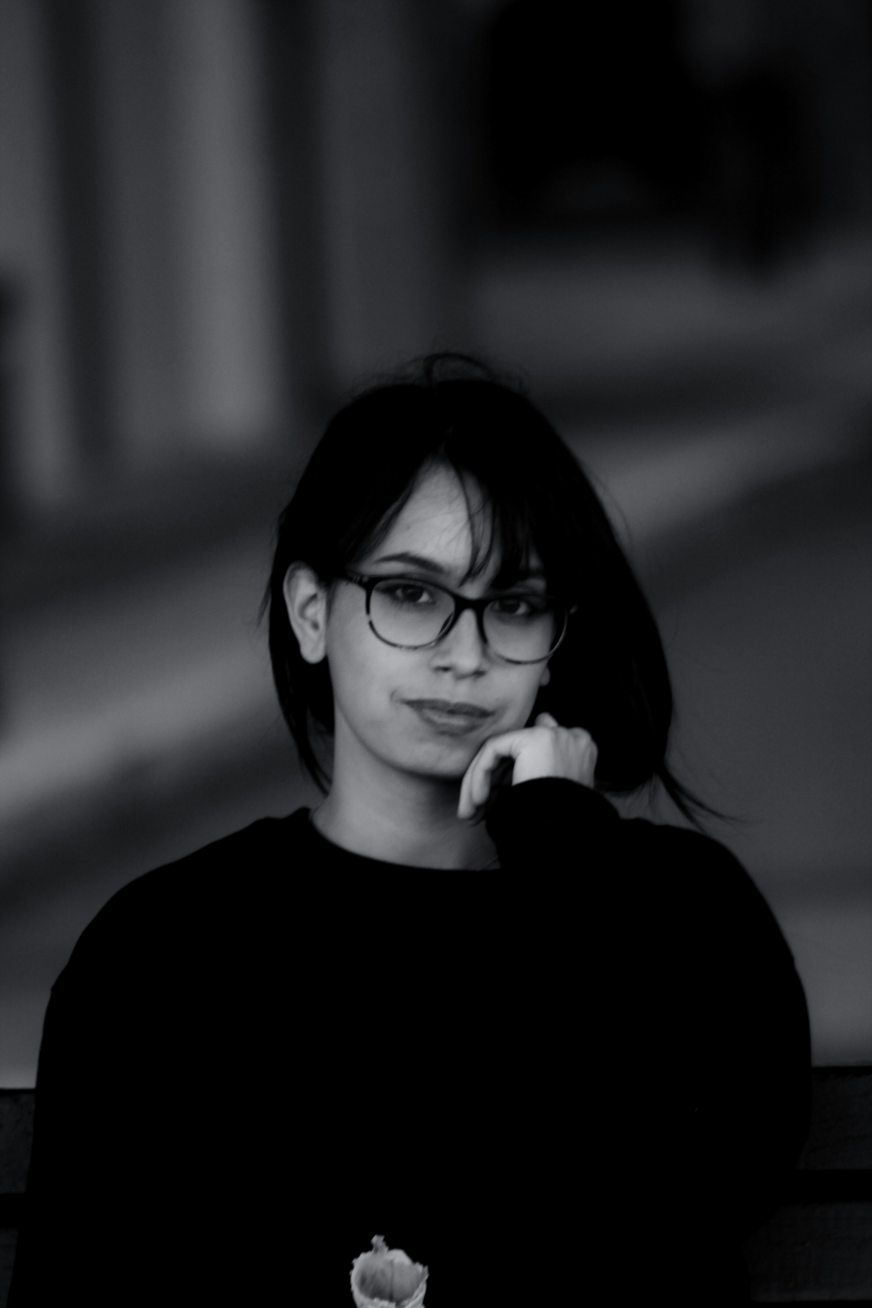 Glasses and Gaze: Quiet Confidence on a Park Bench