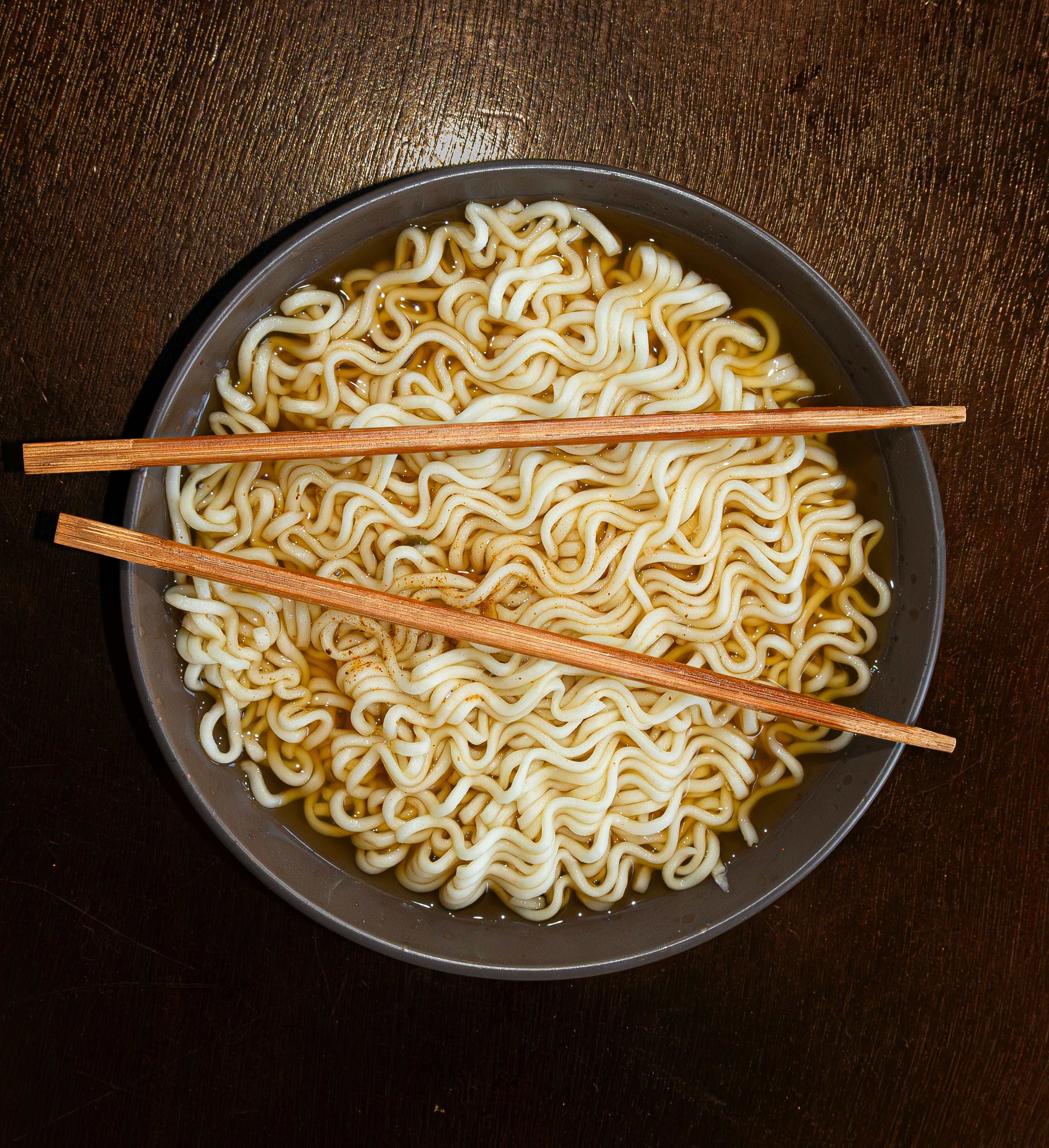 Twisted Noodles and Wooden Sticks: A Quiet Bowl