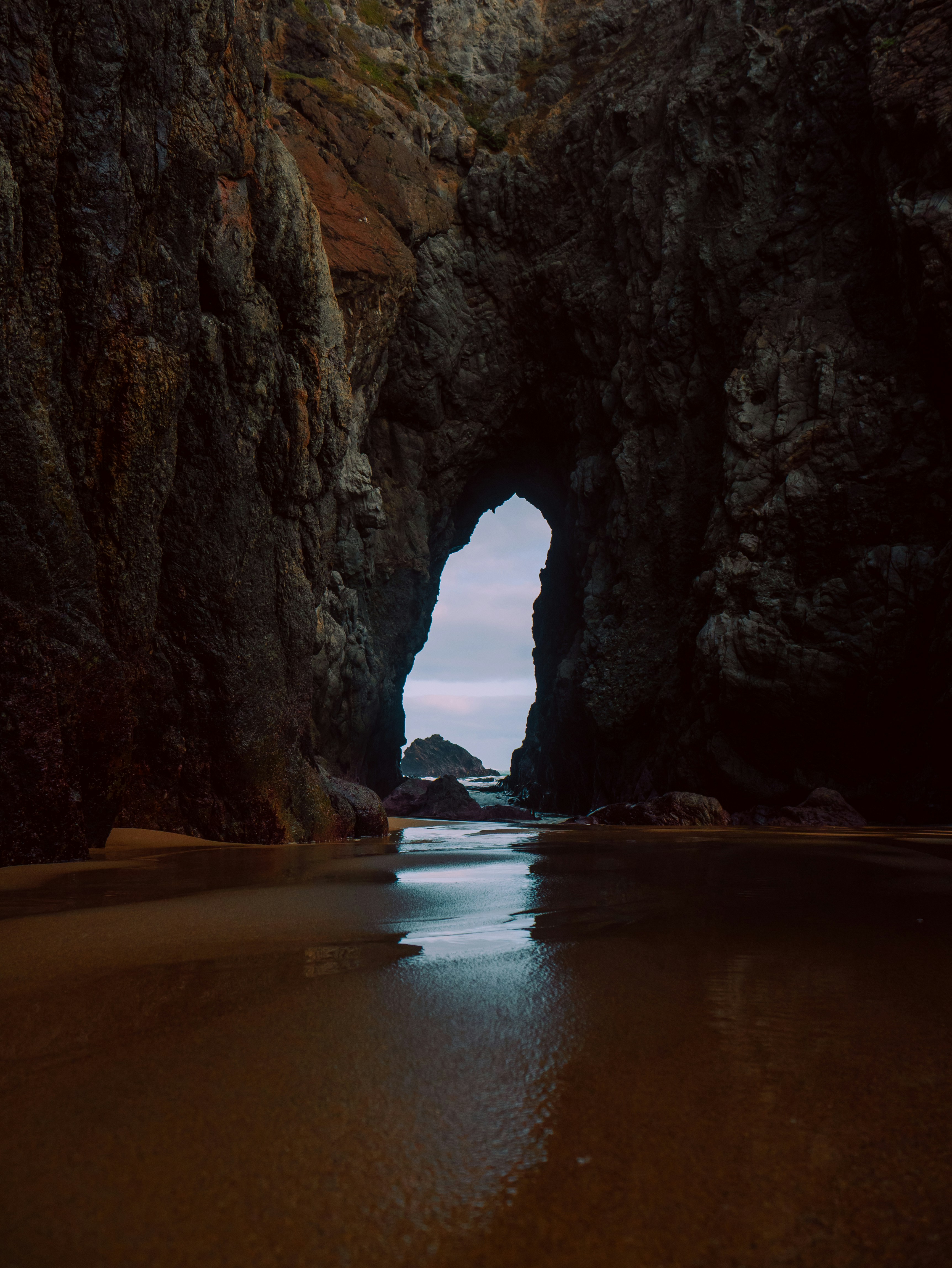 Light Through the Sea Arch: Hidden Passage at the Shore
