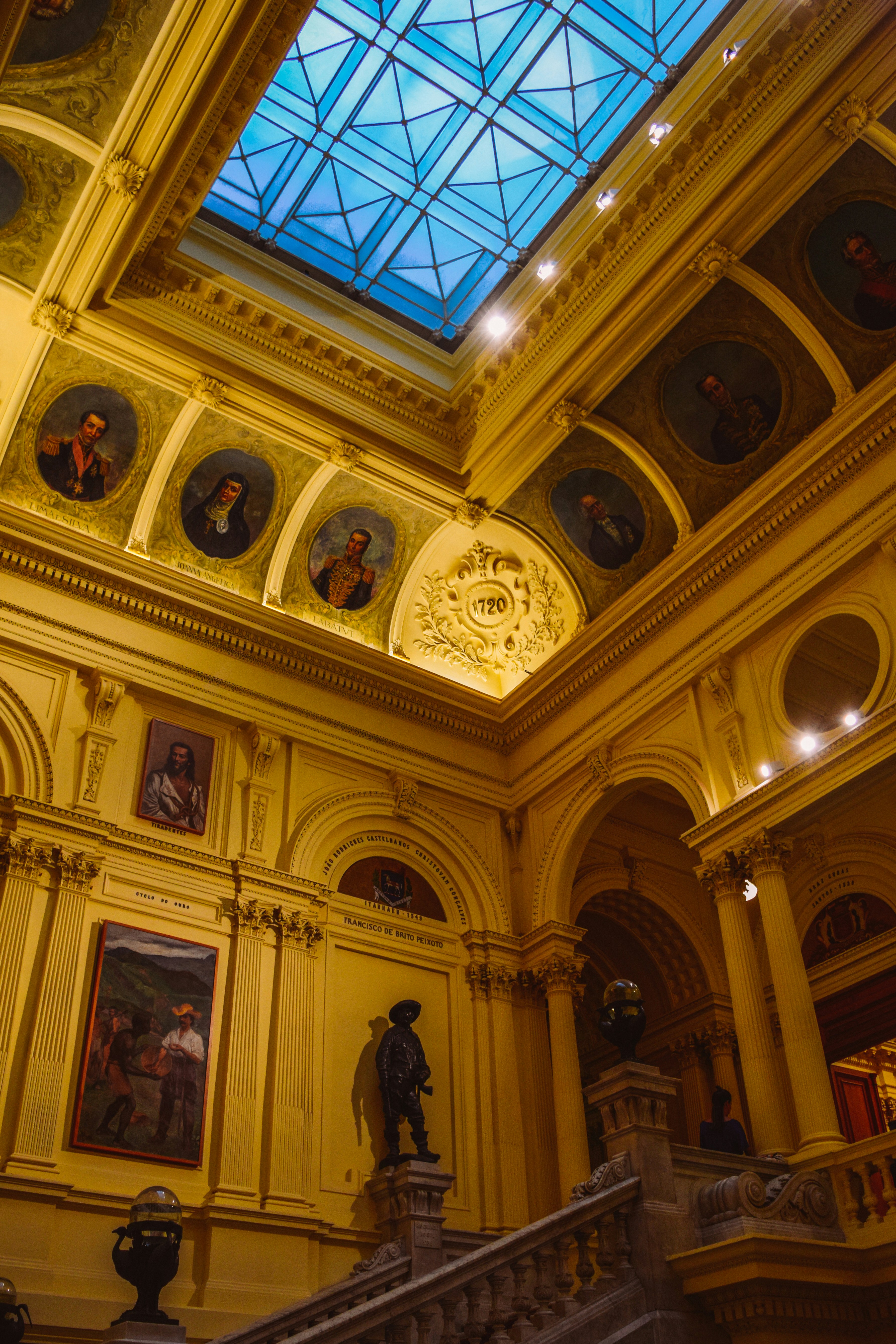 Aglow in the Grand Hall: Portraiture Framed by Heritage Glass