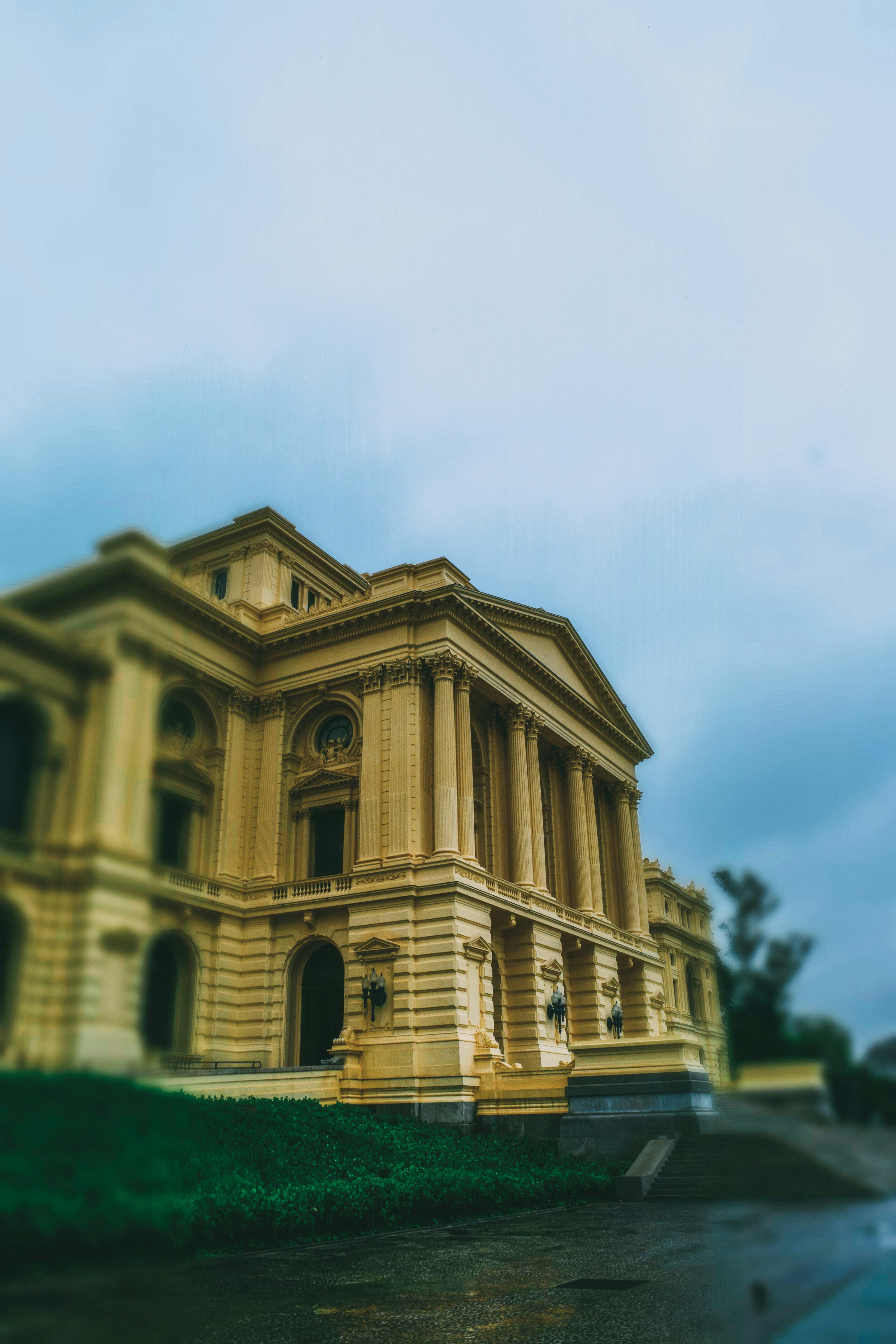 Grand Classical Facade Emerging from Soft Focus Mist