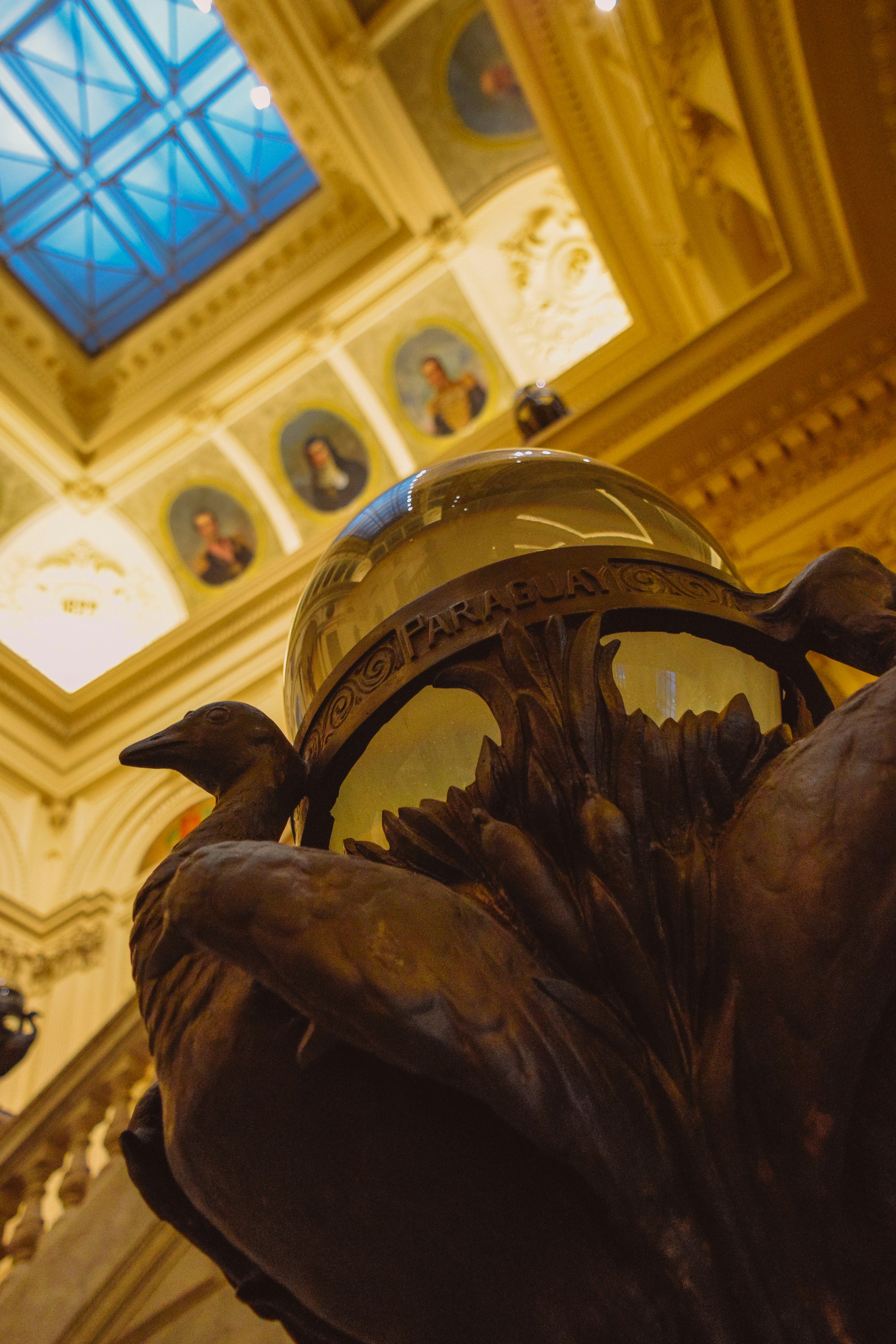 Globe of Reflection: A Brass Bird and Marble Dome