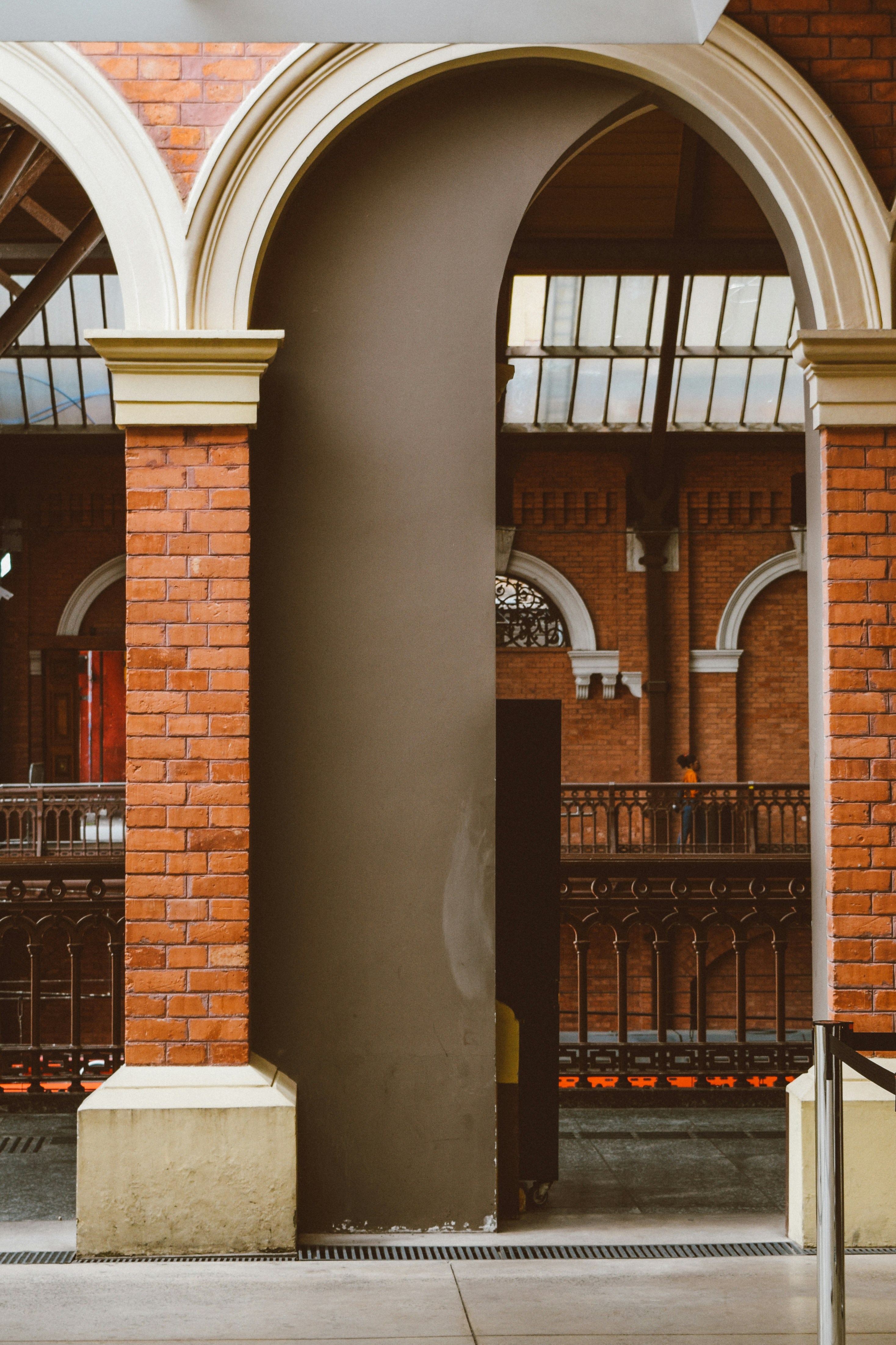 Archway in Red Brick: A Corridor of Quiet Geometry