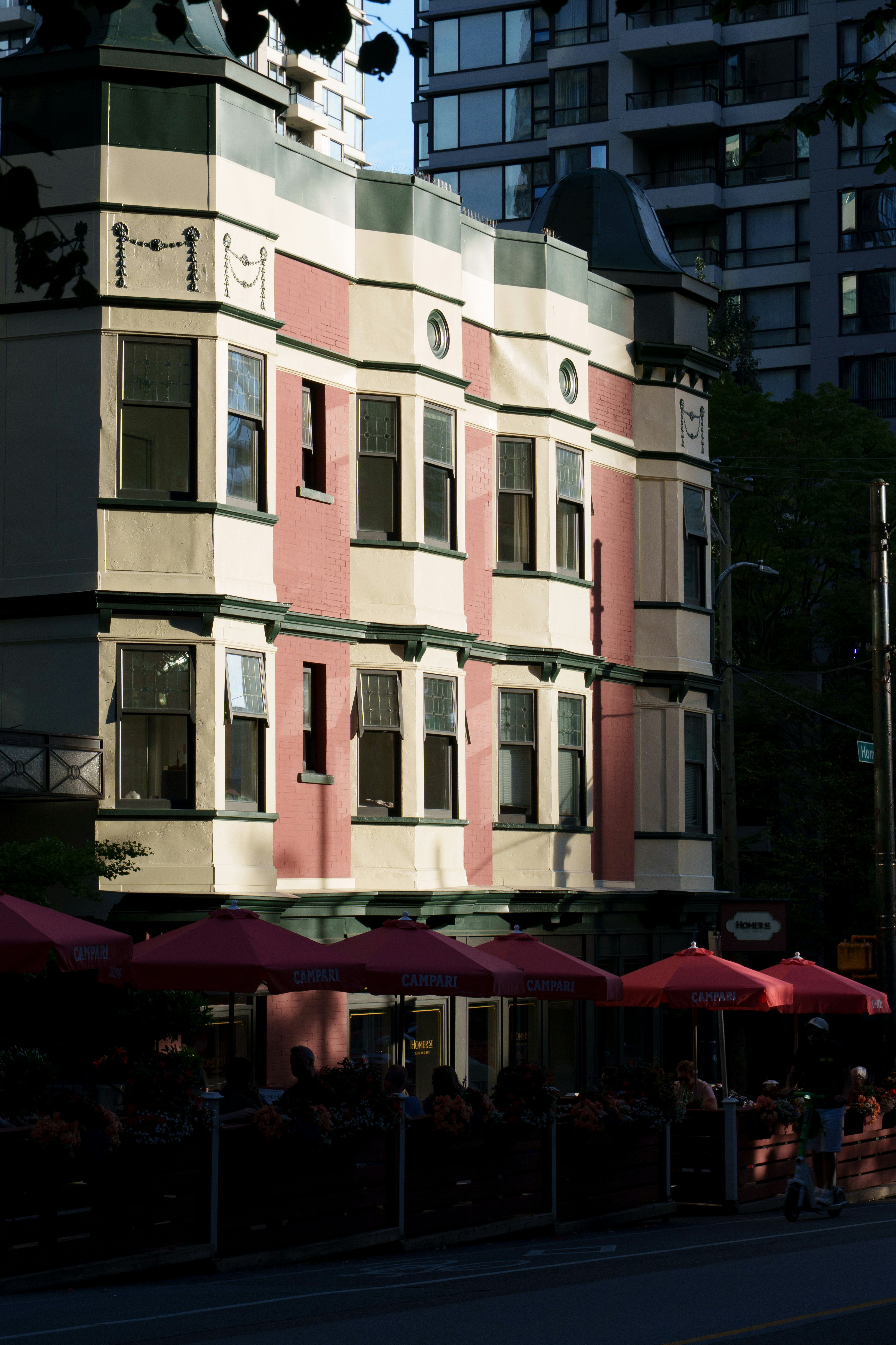 Historic Facade Overhanging the Sidewalk Café