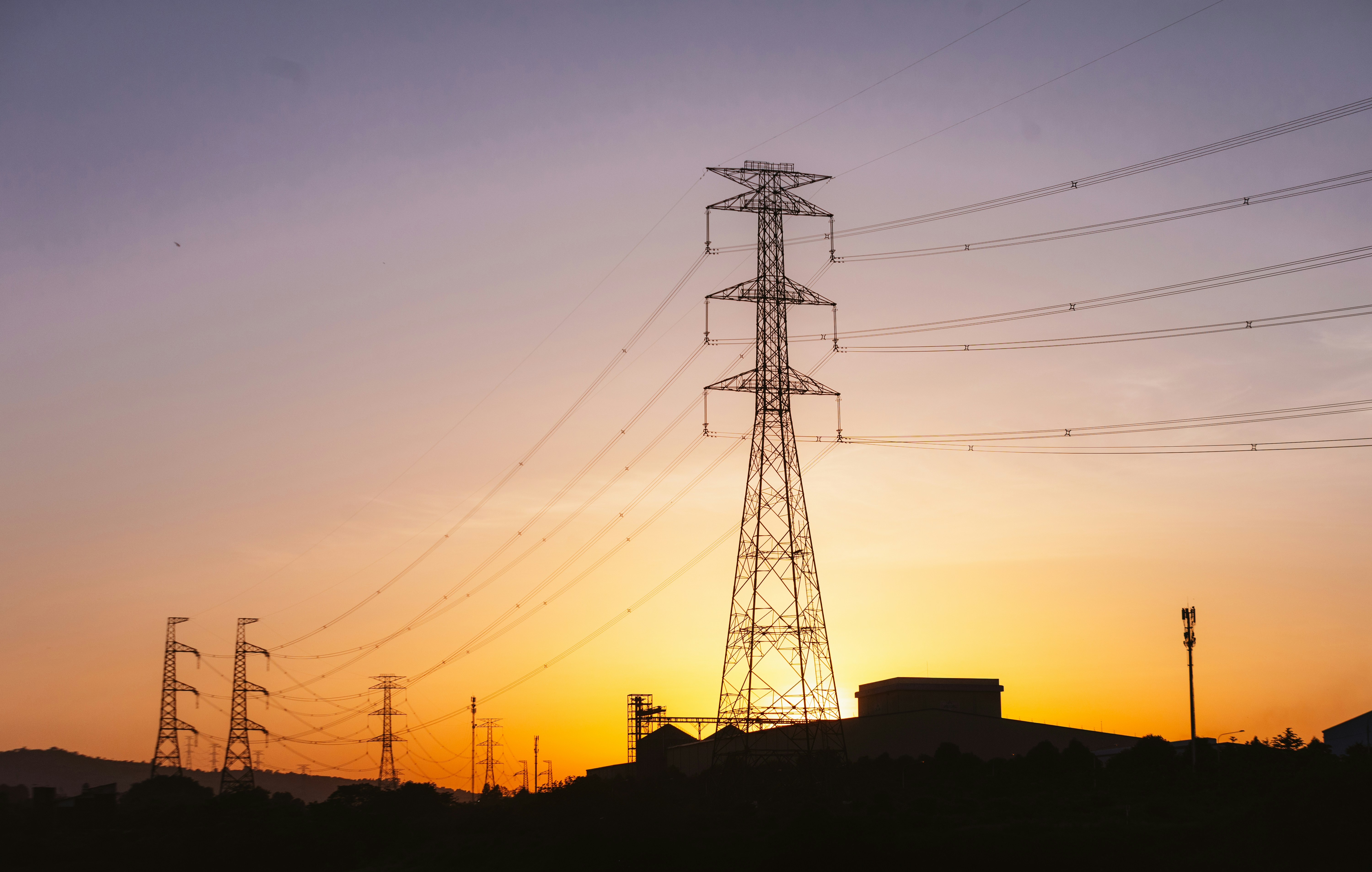 Silhouetted Transmission Skyline at Dusk