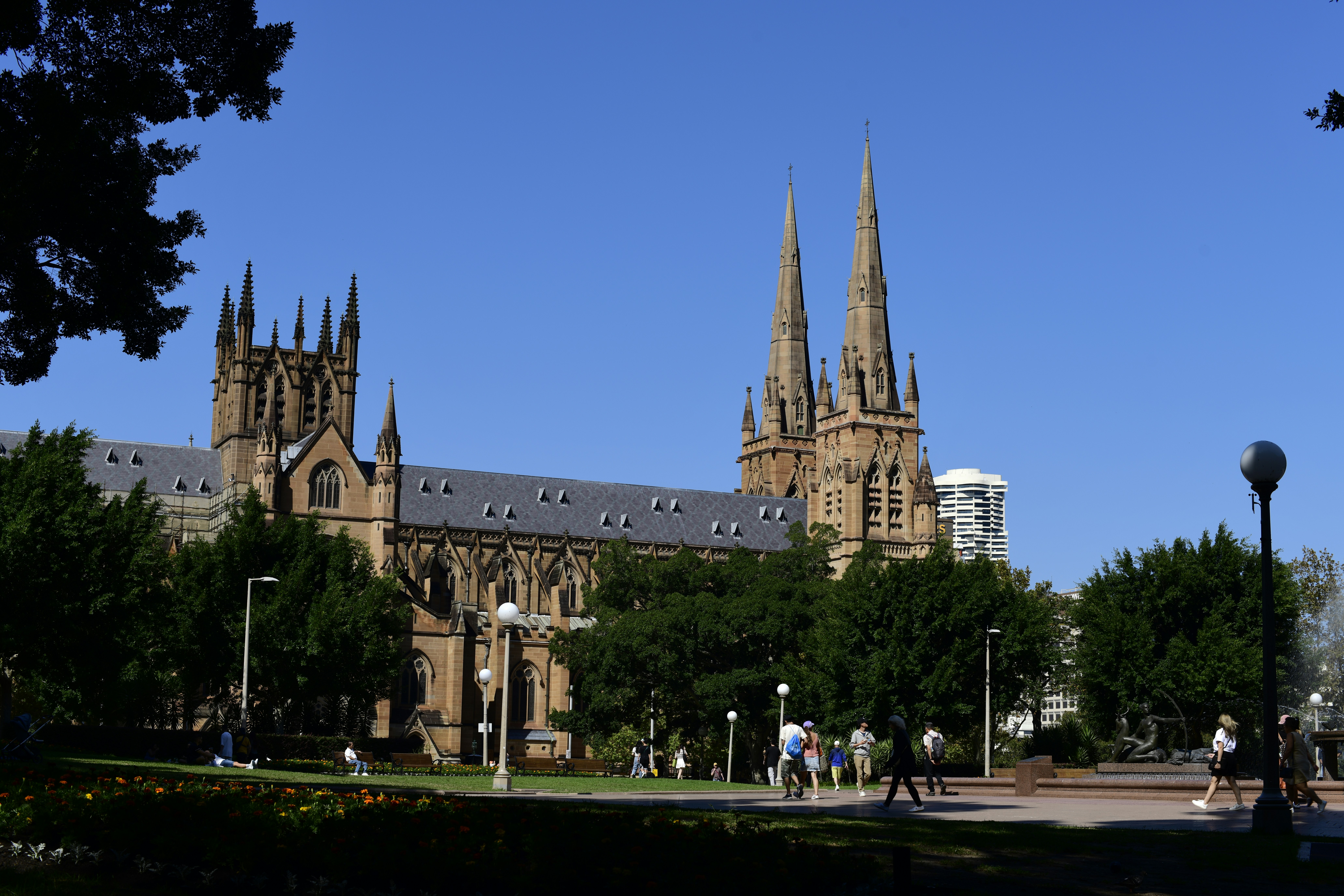 Cathedral Towers Against a Calm City Park