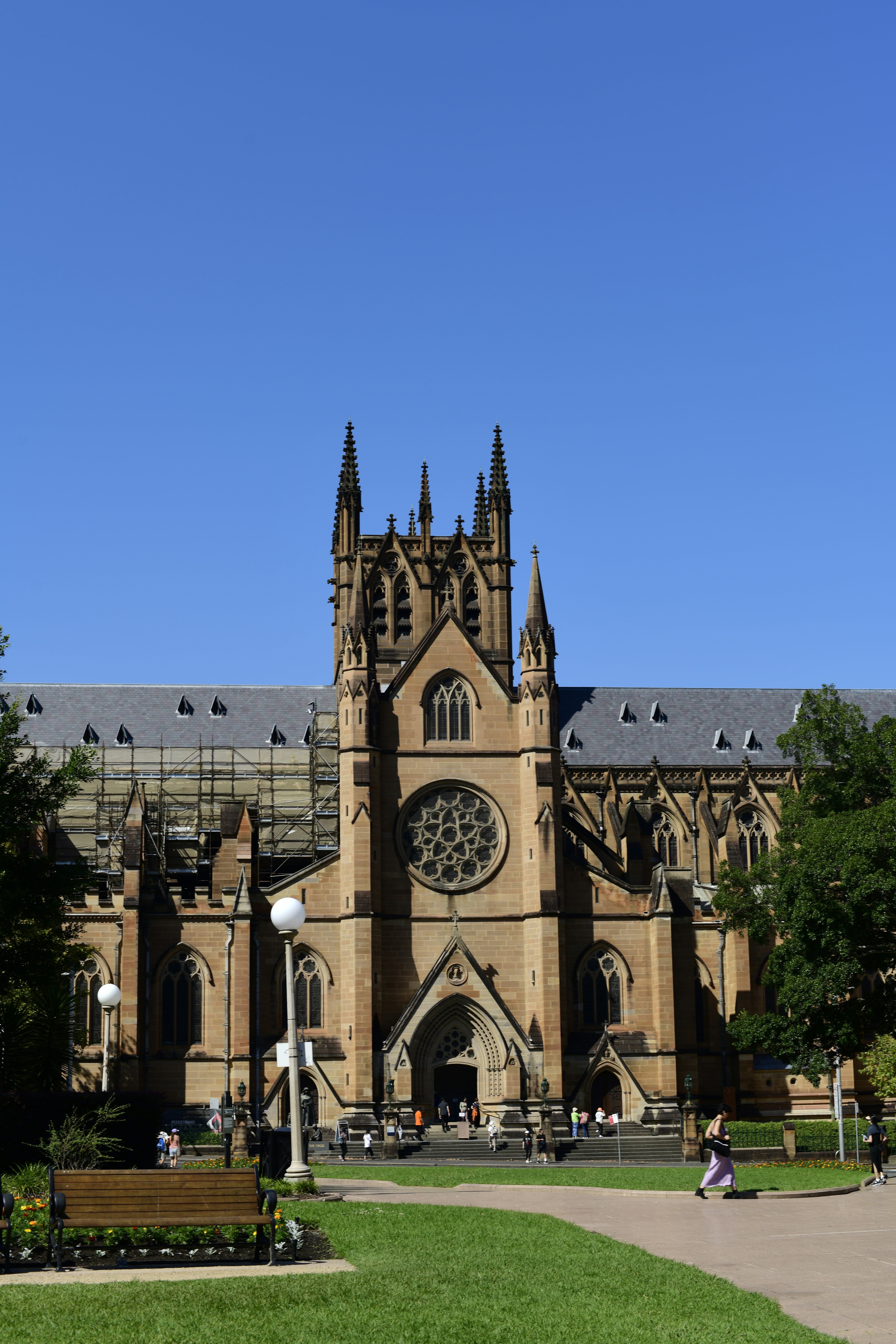 Gothic Facade: A Cathedral Hallway Framed by Green Park