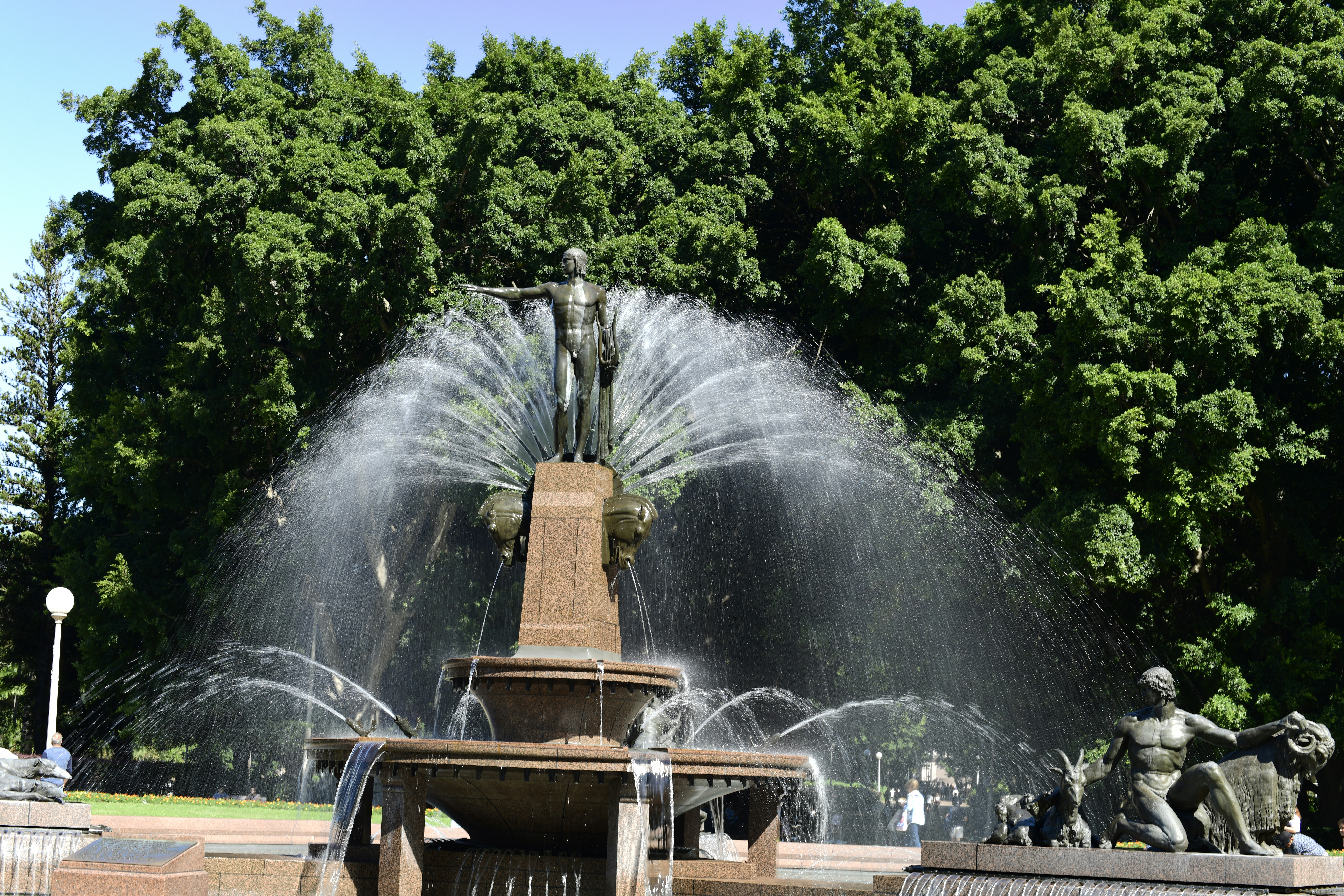 Calm Cascade: Central Fountain with Sculpted Guardians