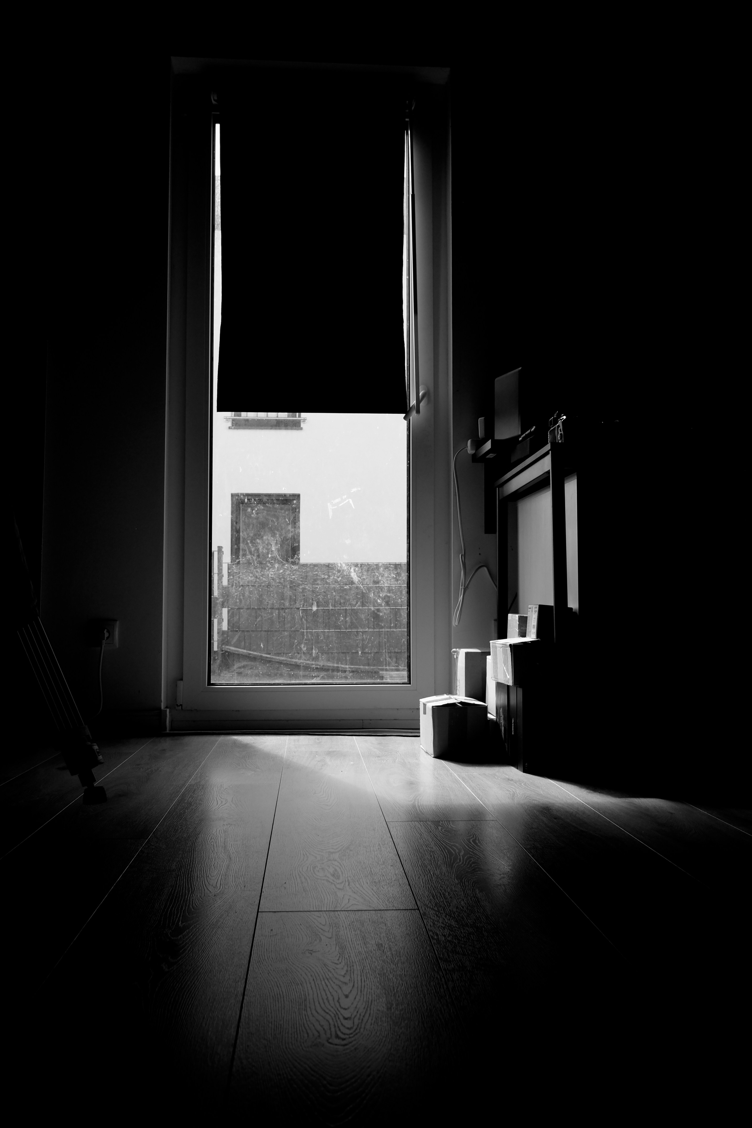 Light Seep Through a Quiet Doorway into Silent Rooms