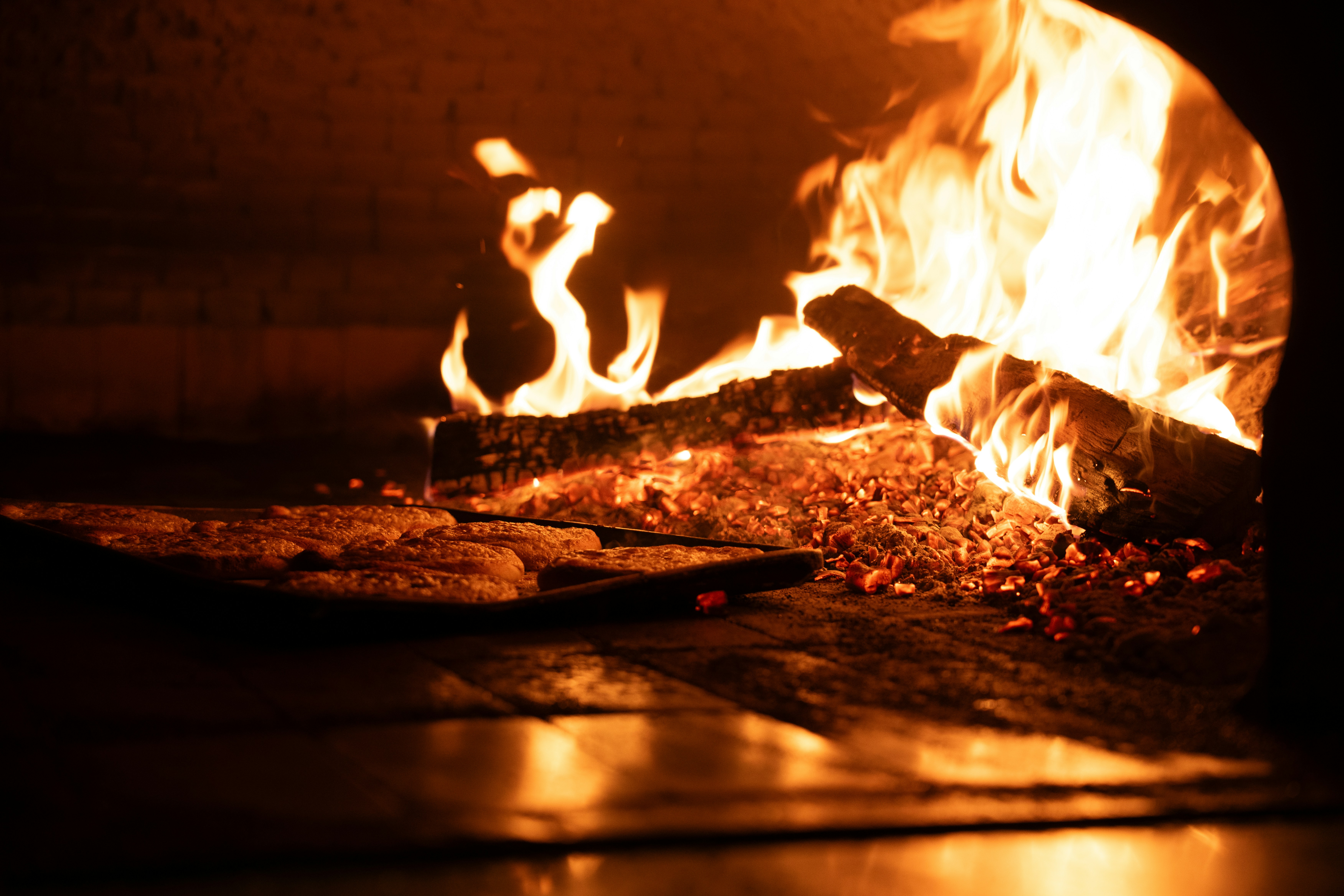 Ember Glow: Firelight Softly Illuminates a Kitchen Hearth