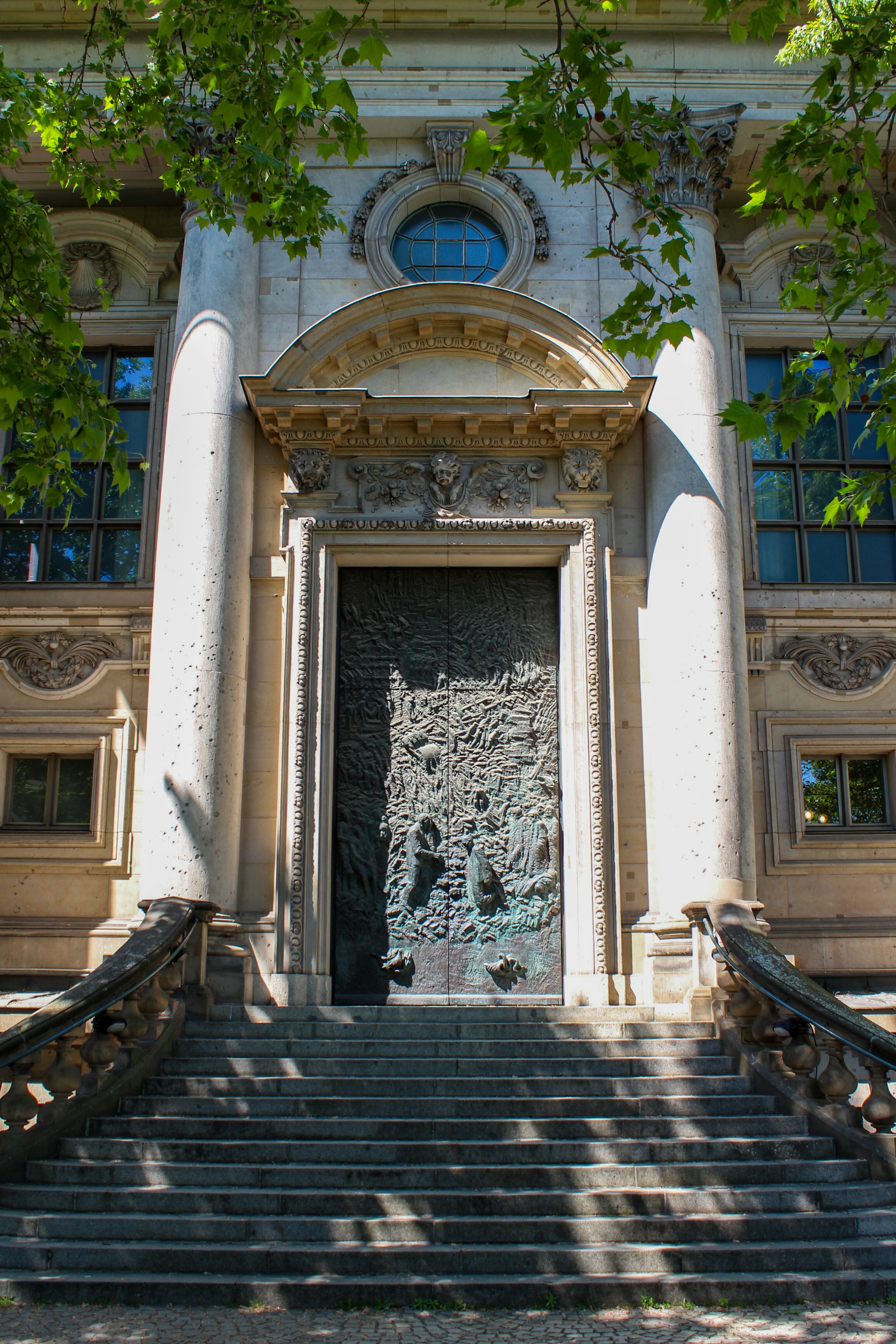 Architectural Guardian: Steps to a Carved Portal