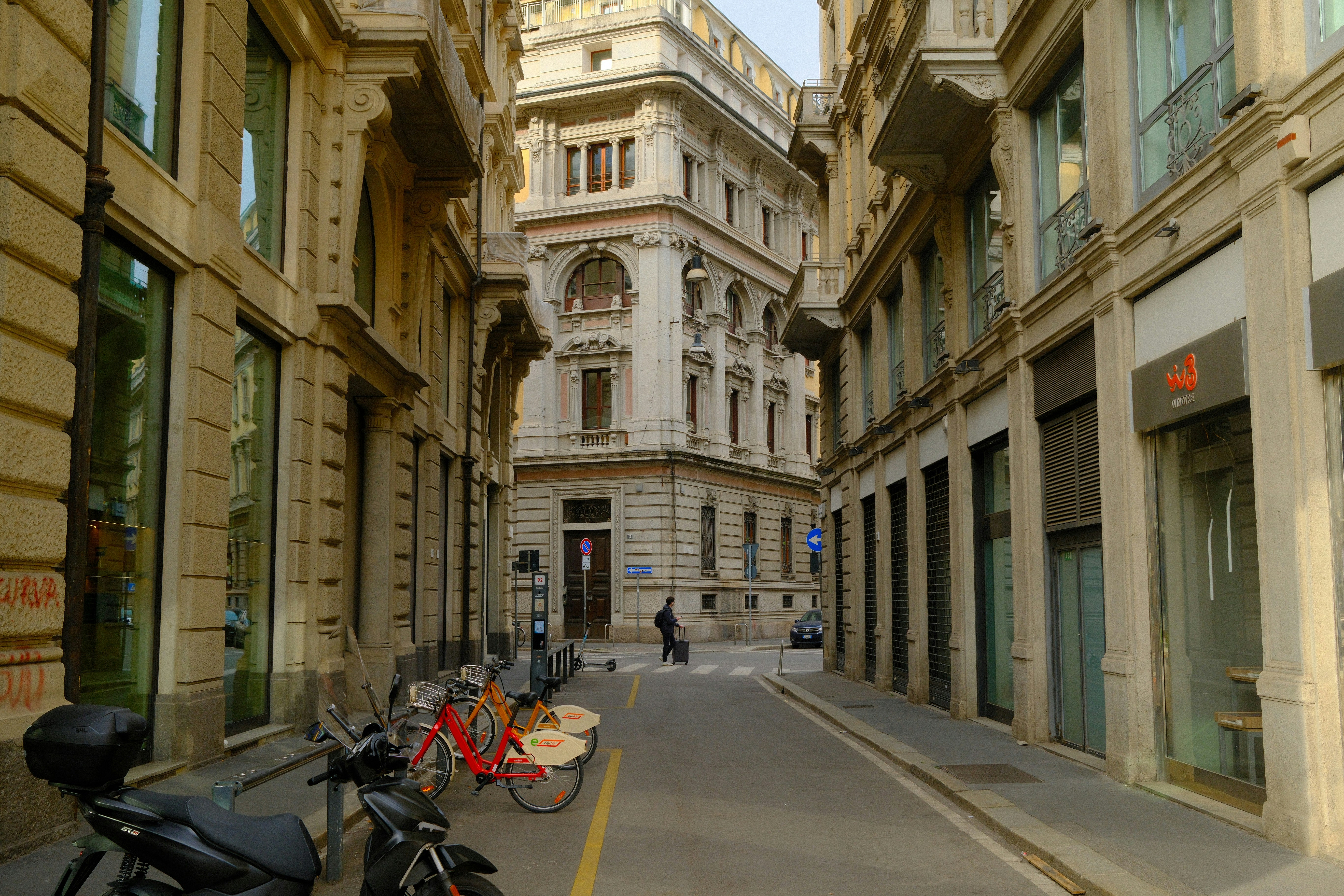 Deserted Street: Architecture Guides the Eye Toward a Narrow Parisian Canyon