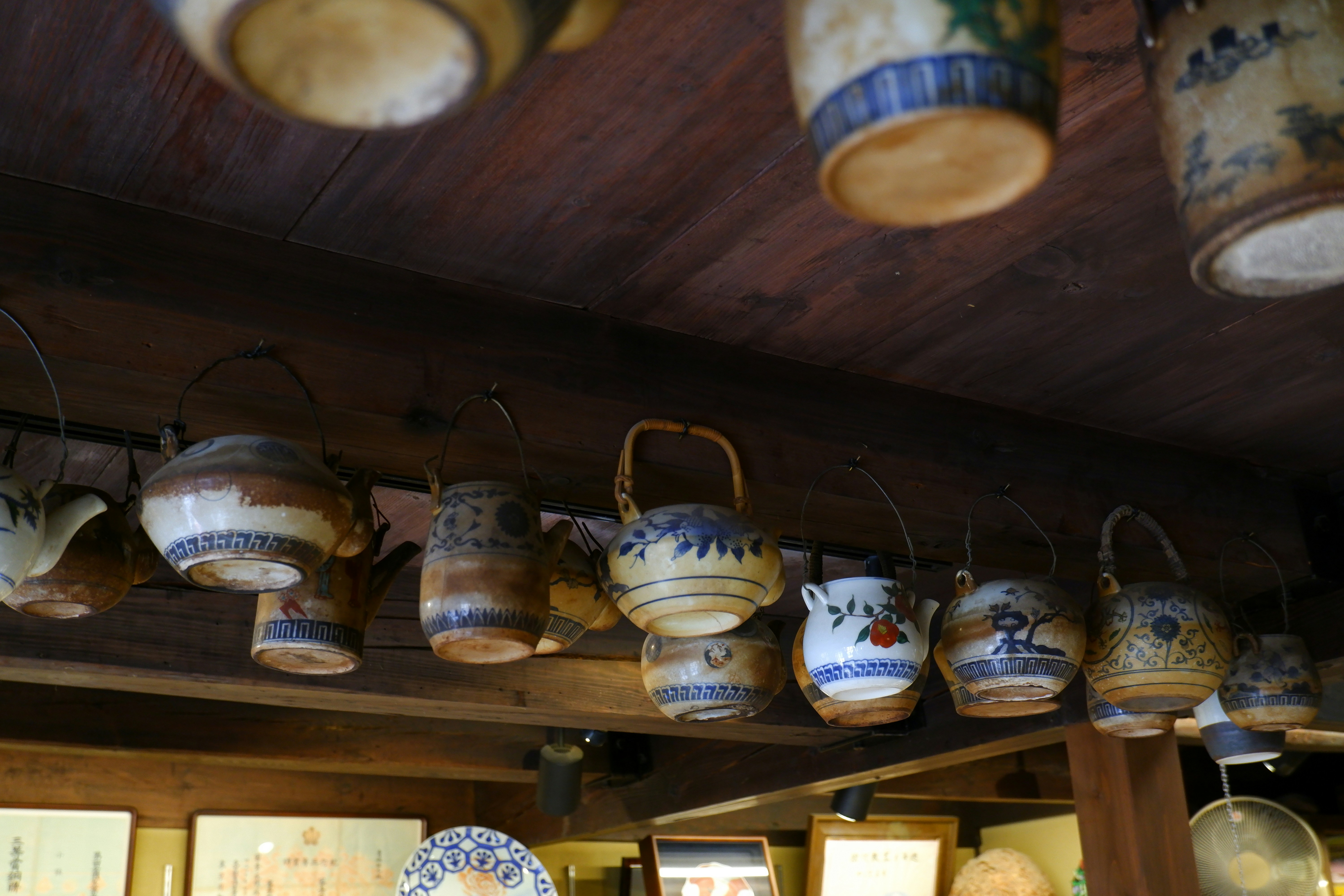 Hanging Ceramics: A Shopfront of Painted Teapots and Jugs