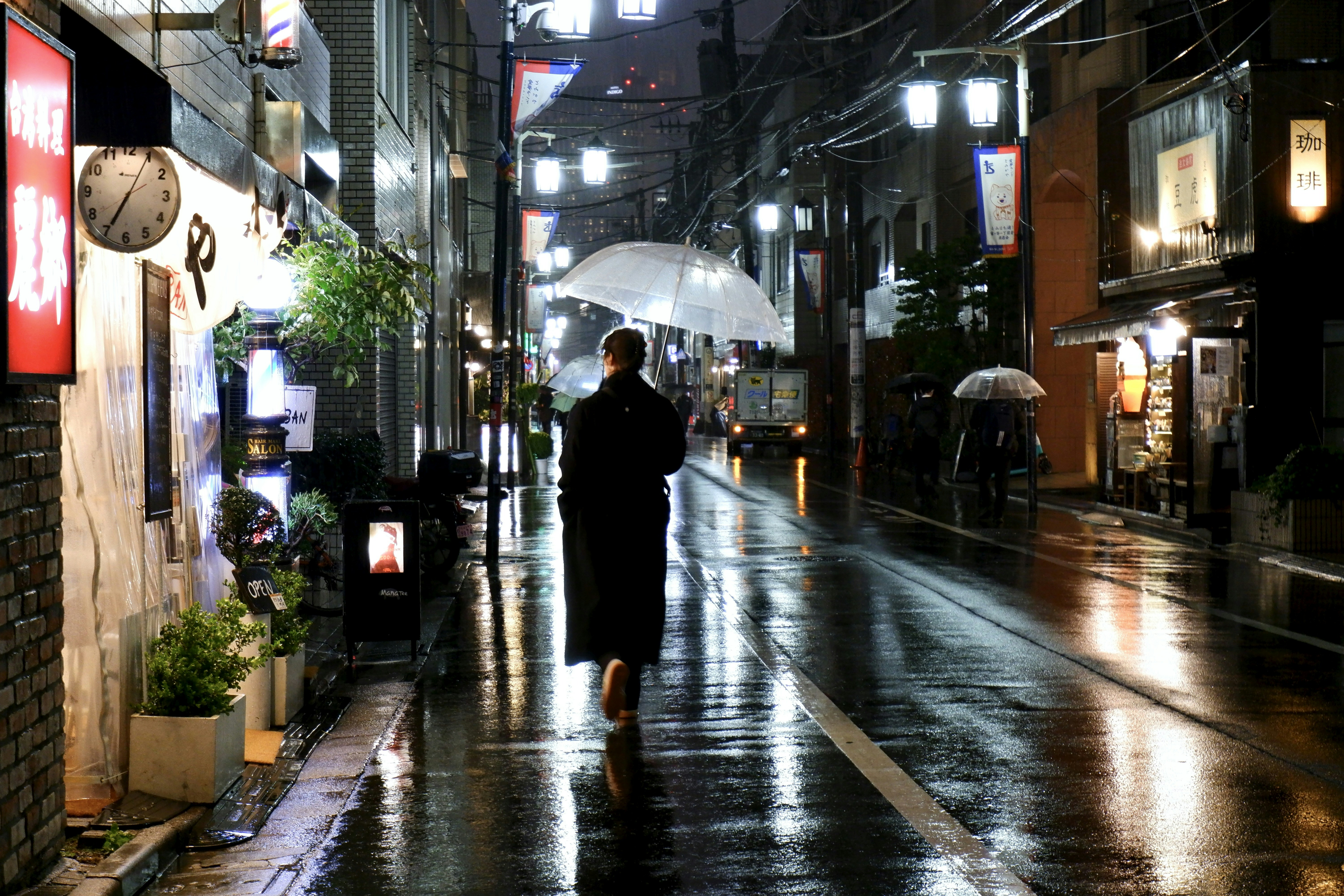 Midnight Run Down Neon Alley: A solitary figure in rain