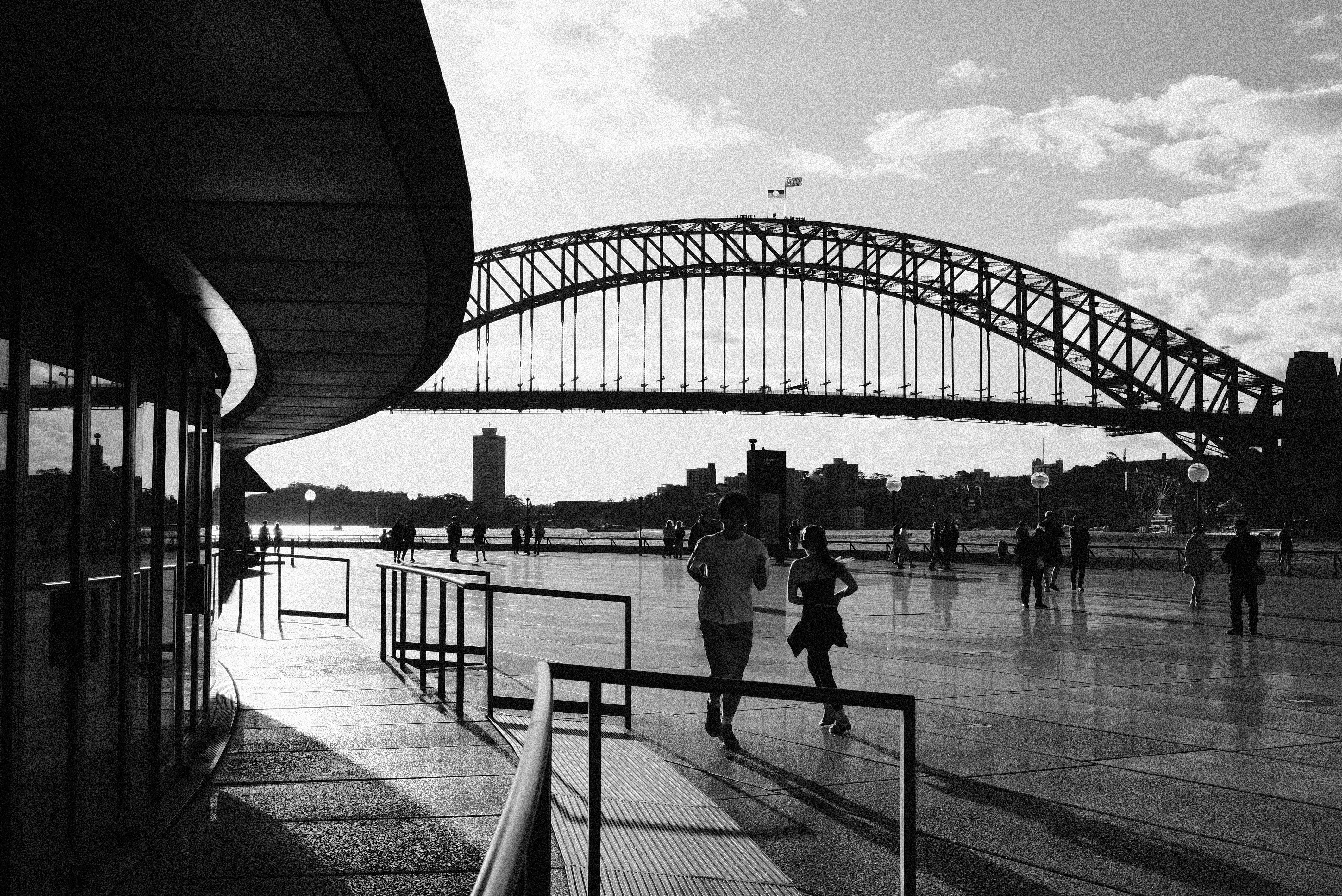 Riverside Stroll Under the Arch: A Quiet City Moment