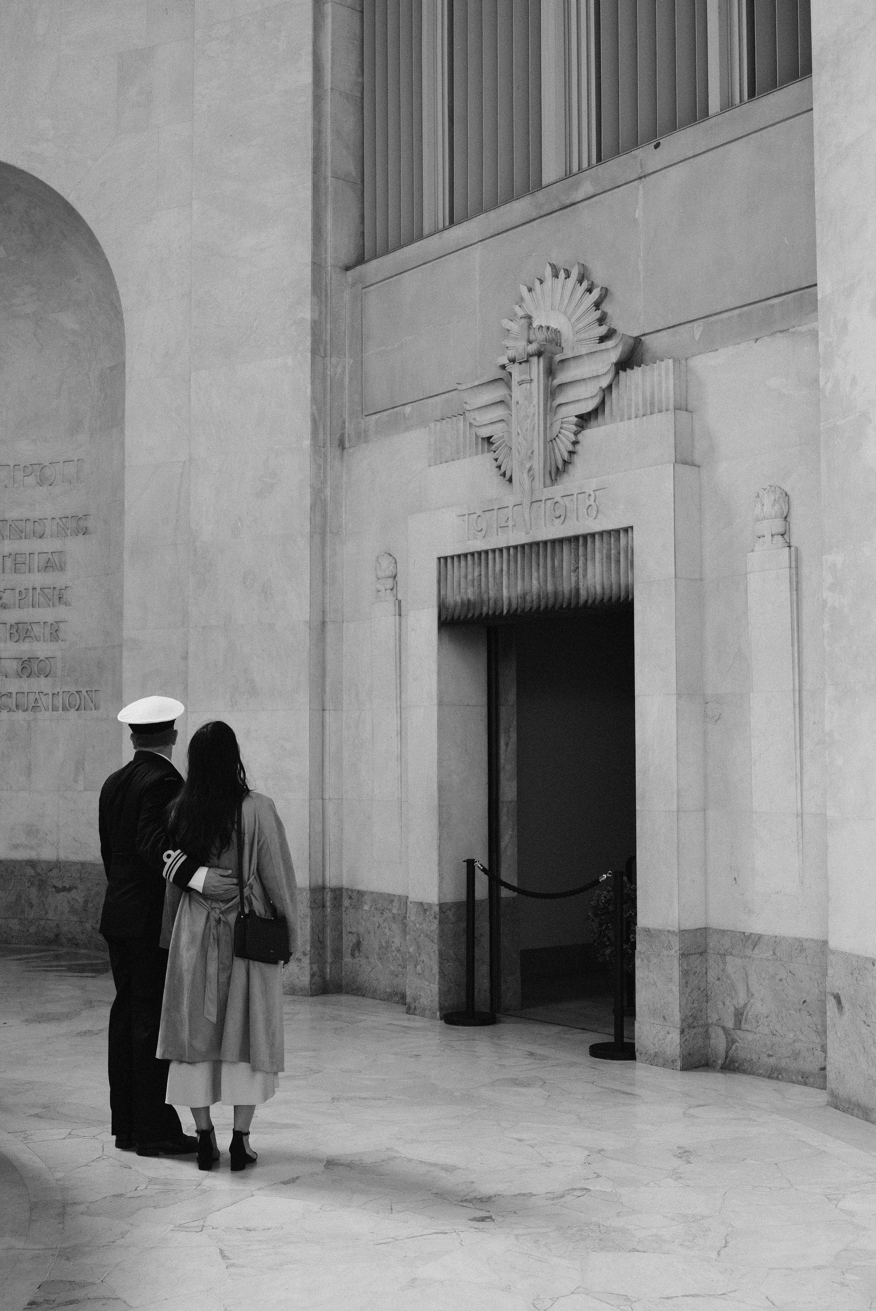 Two Figures at a Monumental Archway