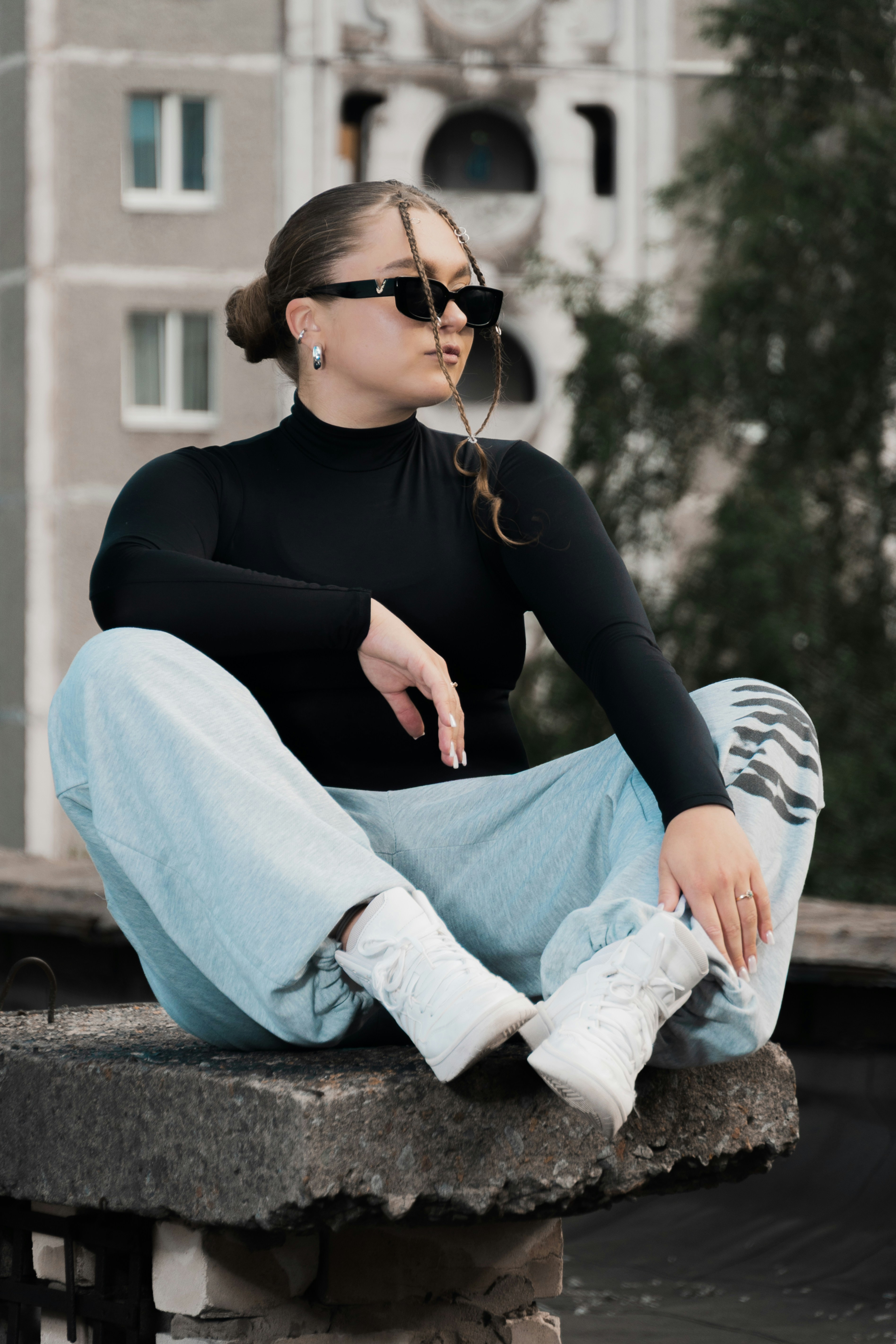 Urban Rooftop Quiet: The Pose on Concrete