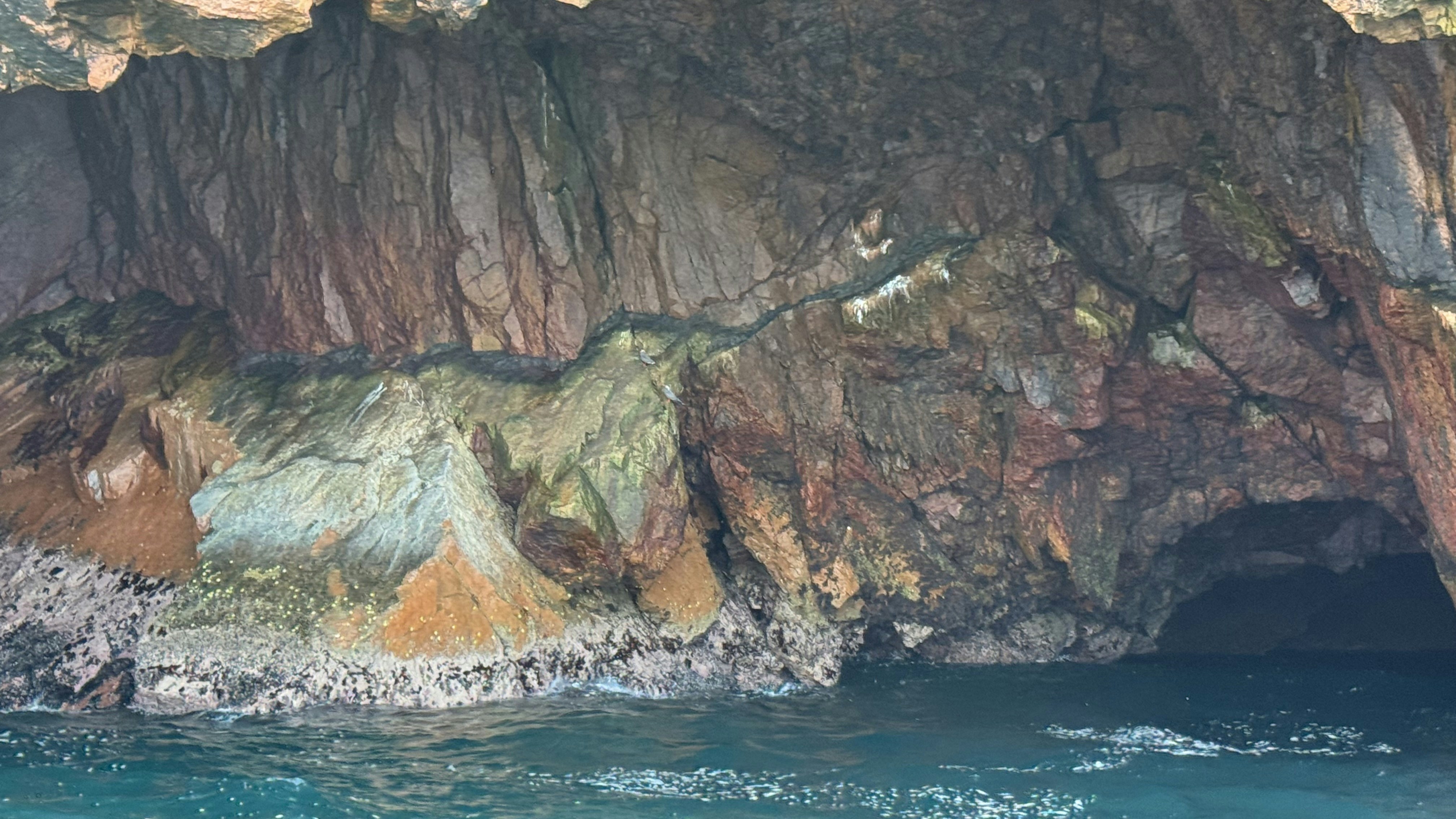 Cavern Edge Over turquoise Waters