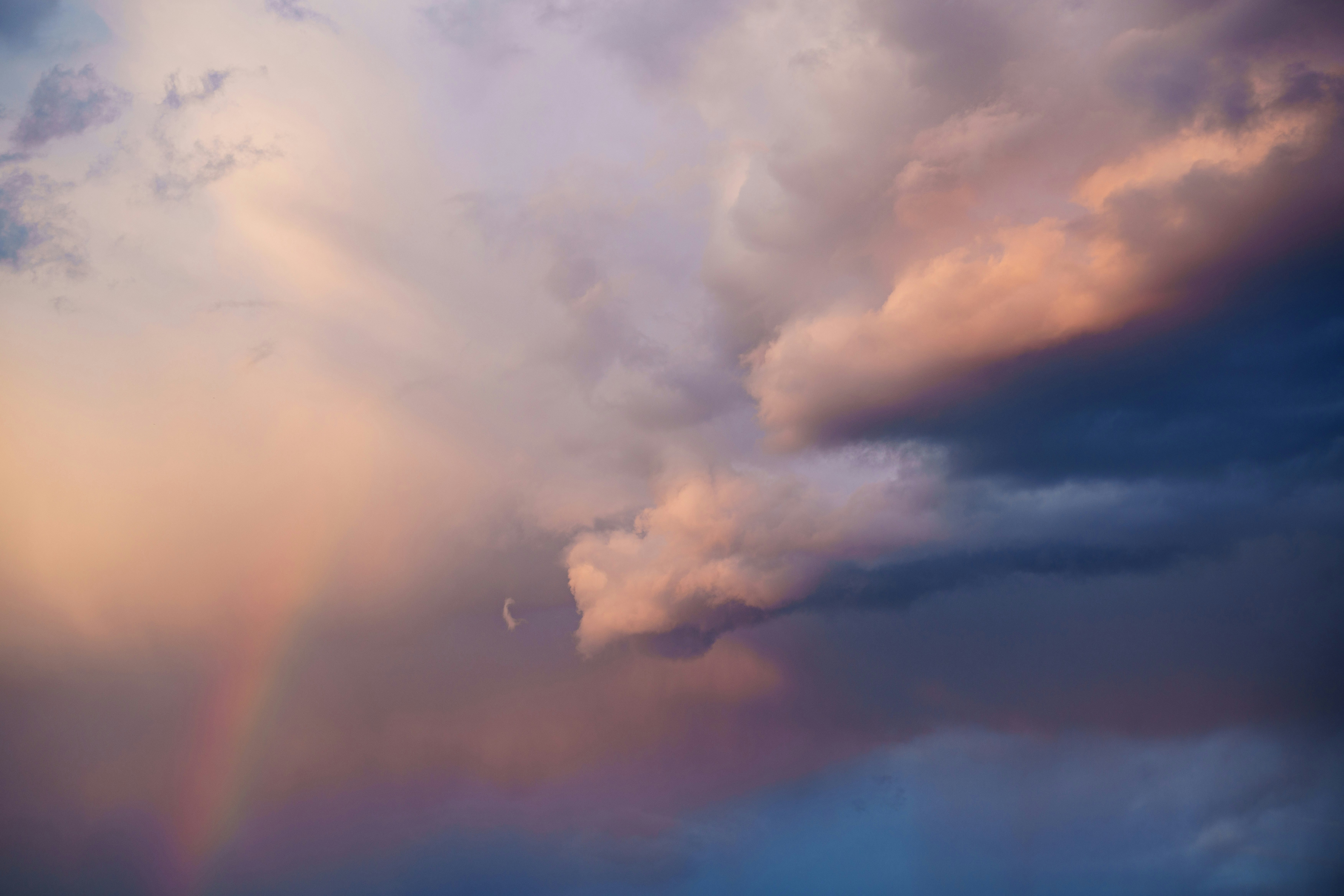 Rainbow Veil Across a Dreamy Sky