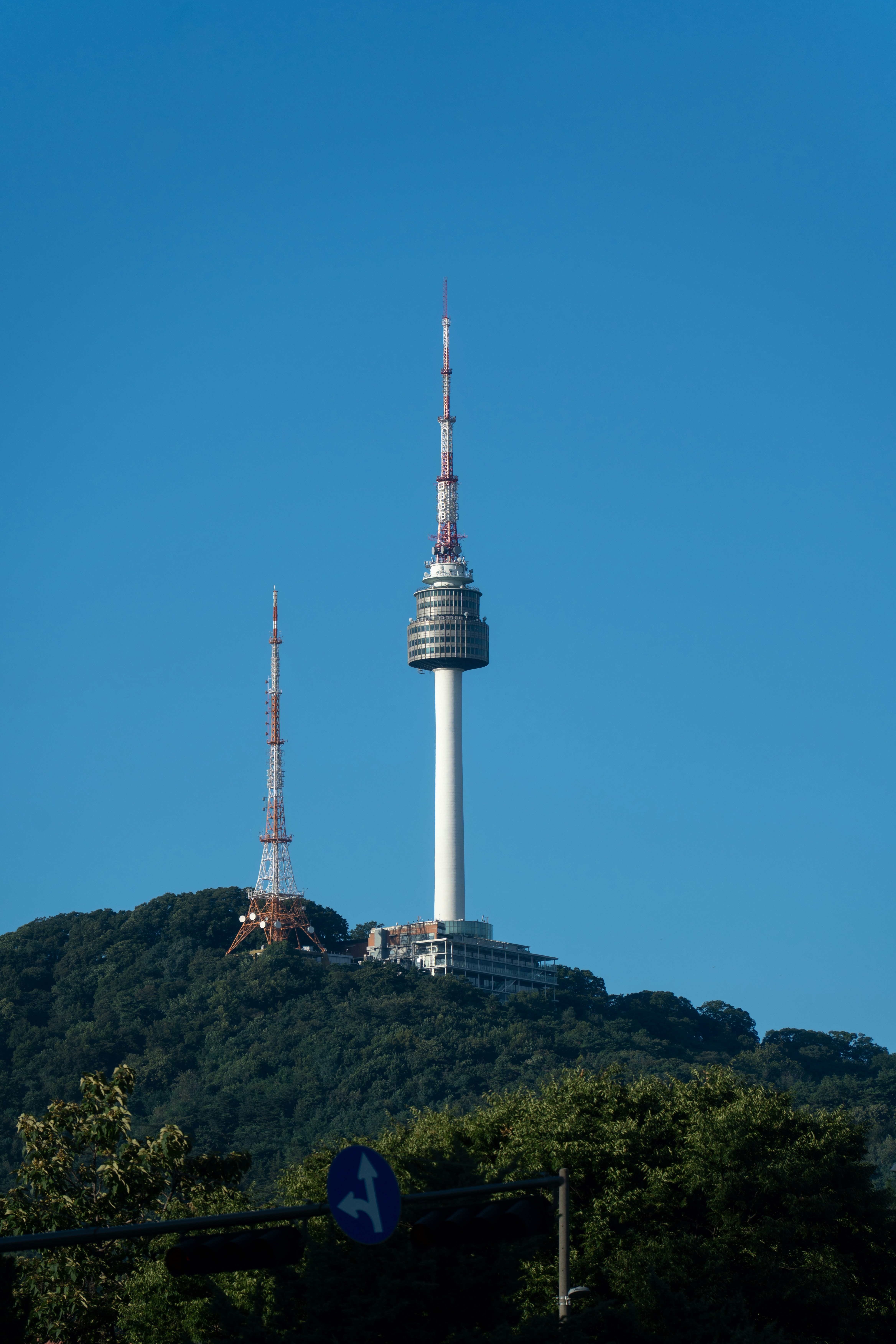Towering Skyline: Seoul's Namsan Tower Reaches for the Clear Blue
