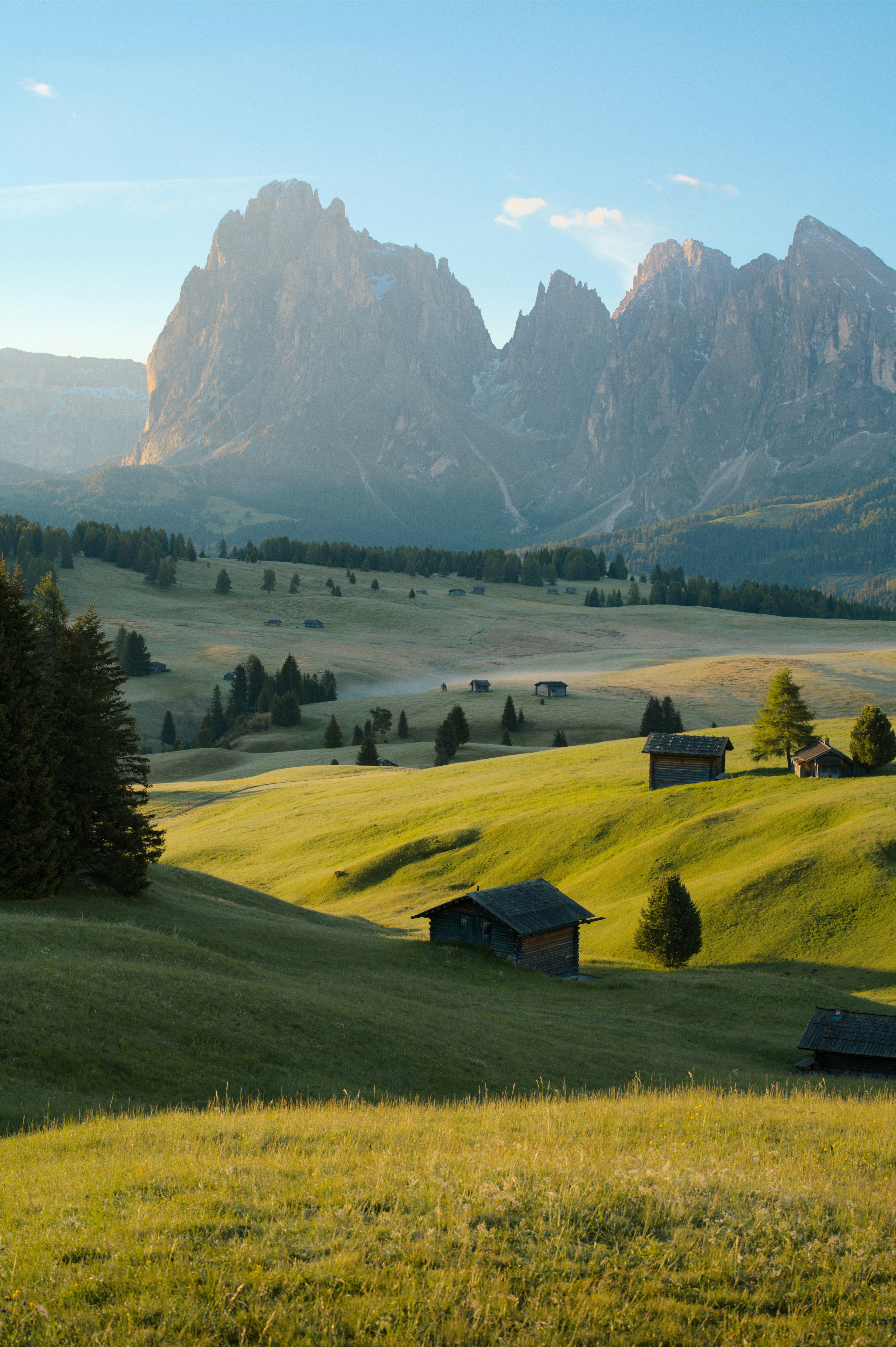 Dawn Over the Dolomites: Quiet Valley of Wooden Cottages