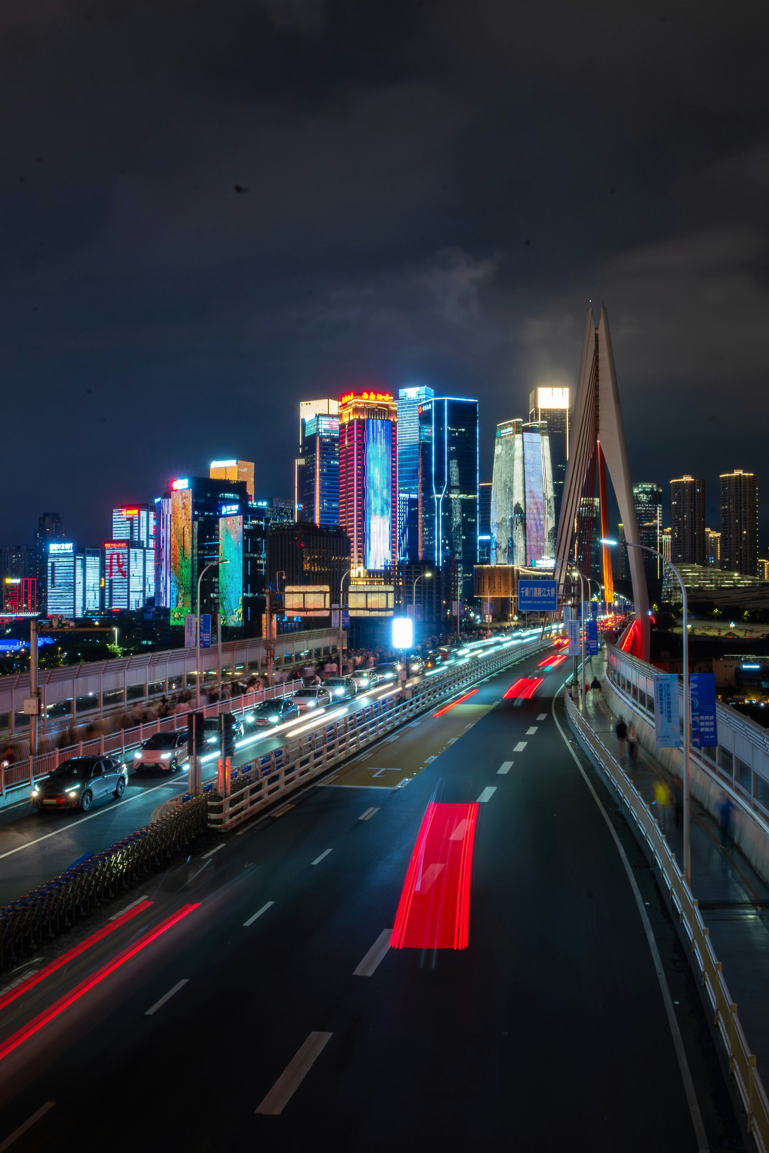 Neon Skyline over a Velocity Stream: Night Road in the City