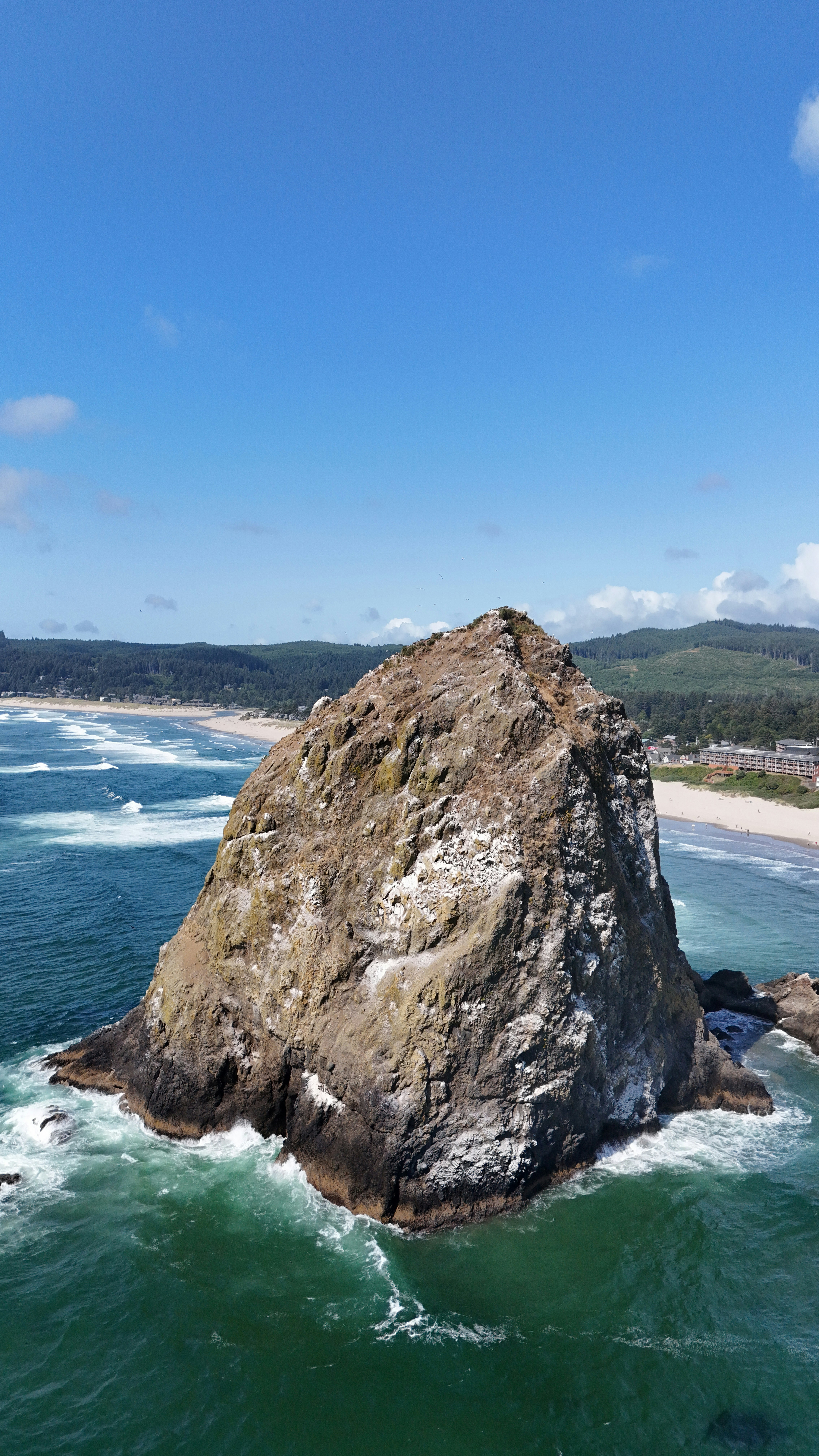 Sea-Scaled Monolith: A Lone Rock Rising from the Pacific