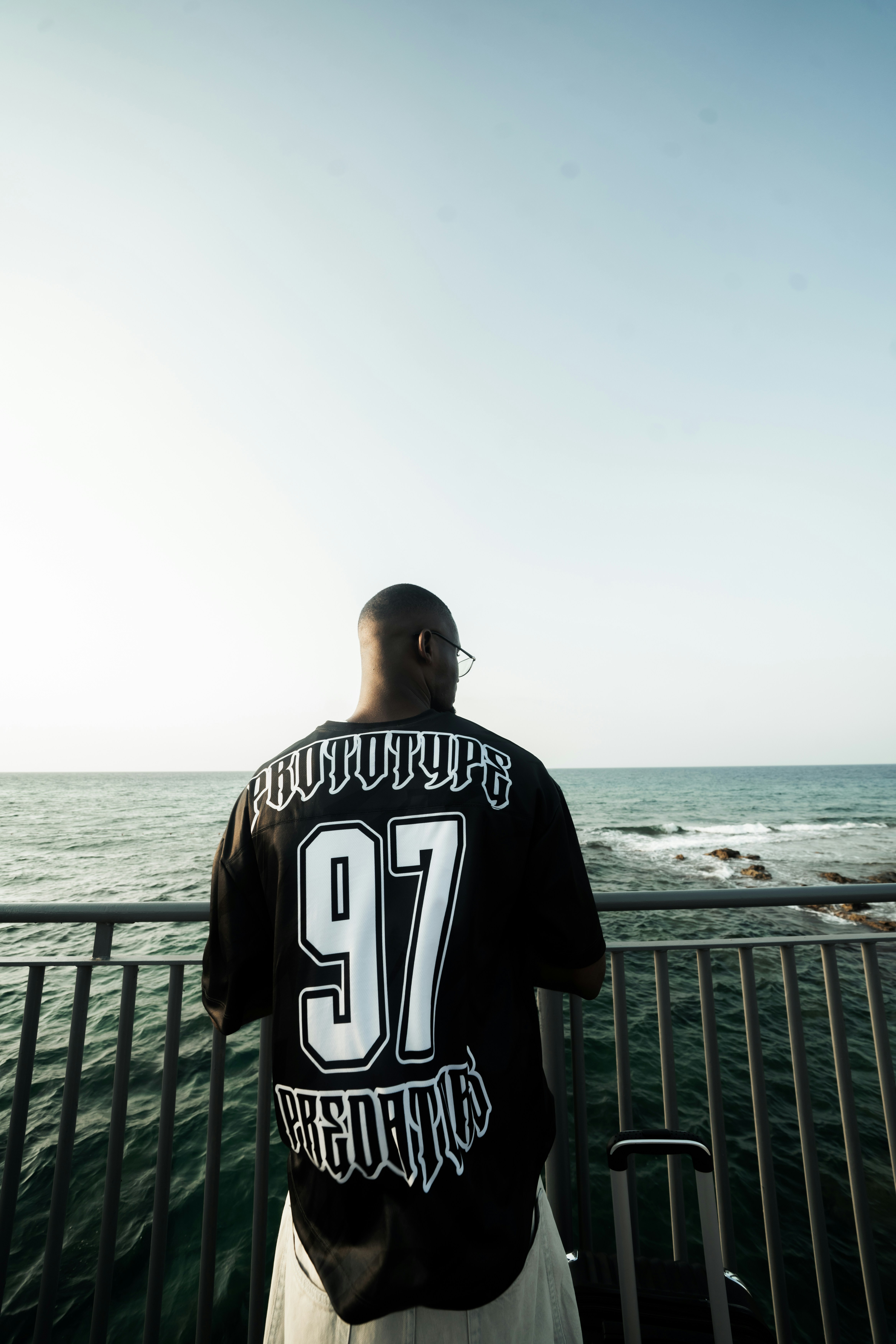 Rear-View Portrait at the Ocean Pier