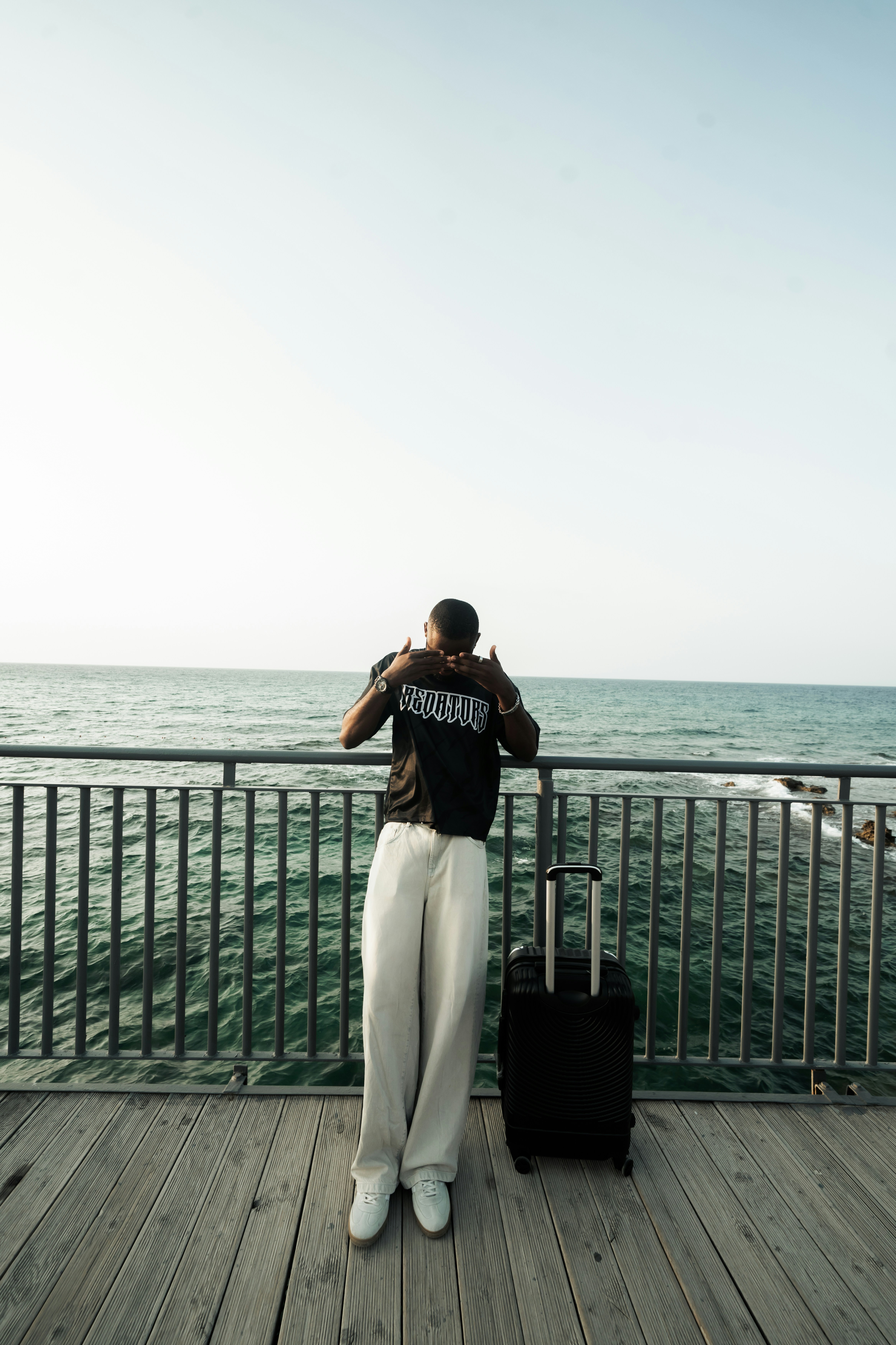 On the Cusp of Horizon: A Traveler’s Quiet Stance