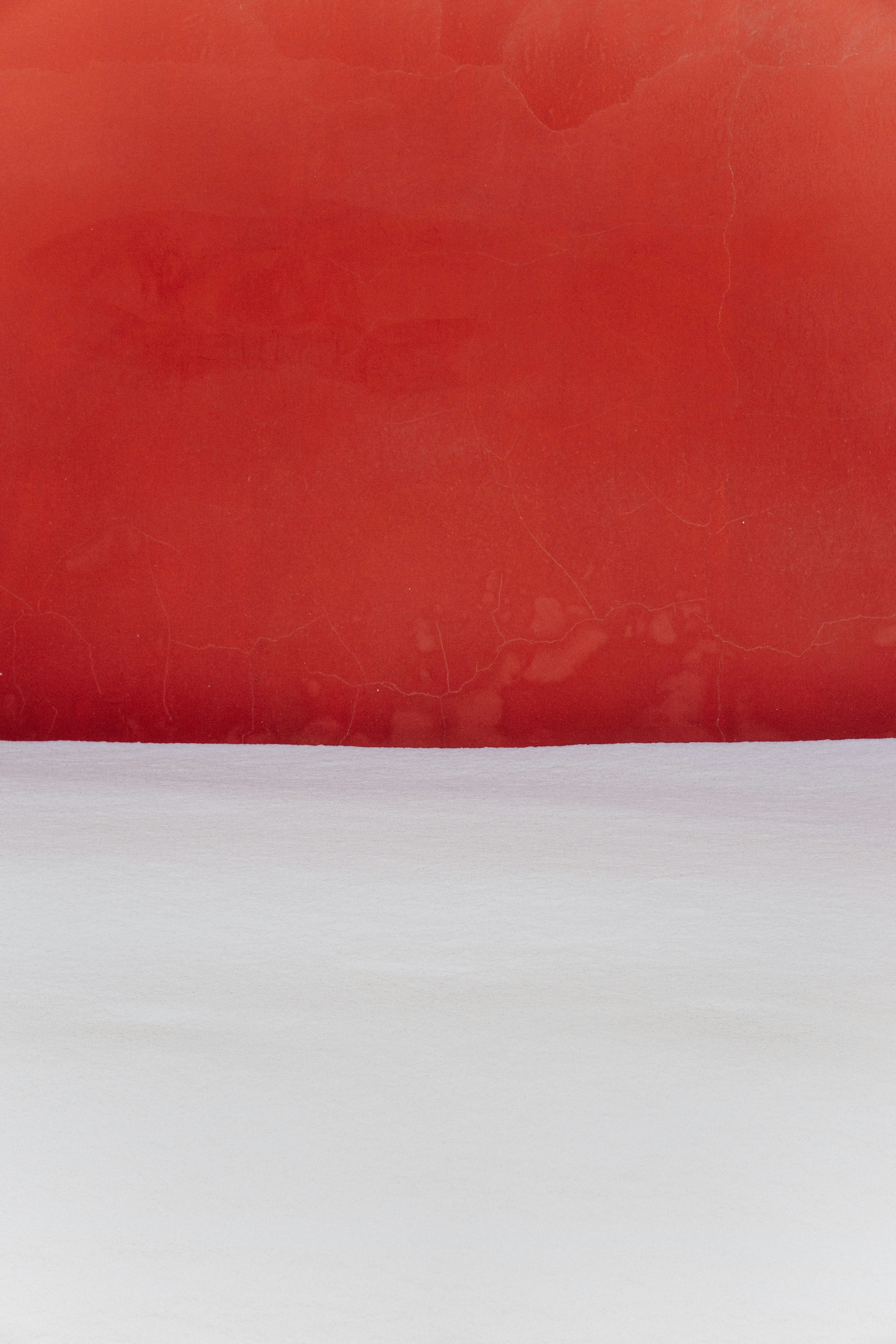 Crimson Divide: Boundary Between Color and Quiet Snow
