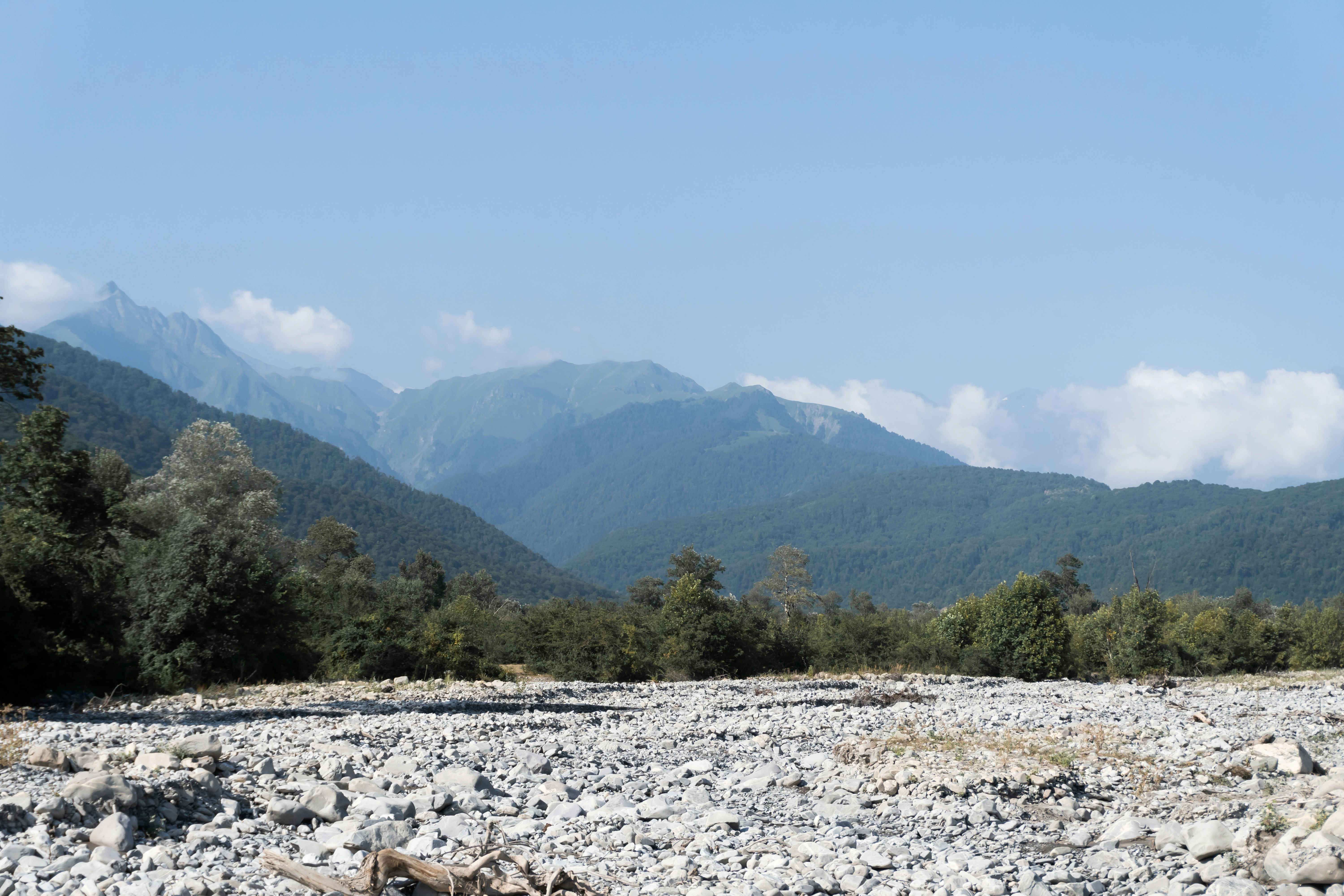 Peaks Beyond the Pebble Riverbed