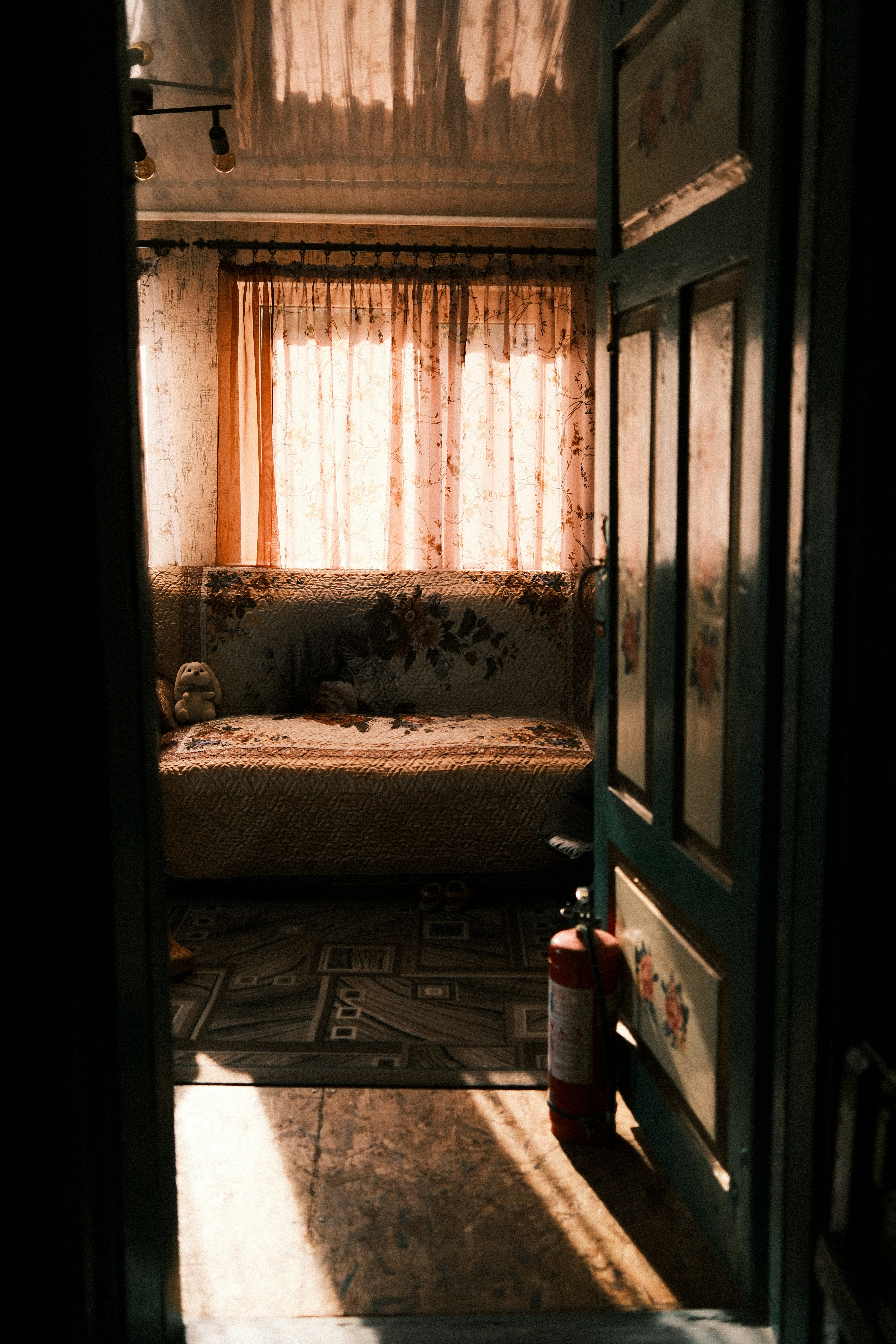 Light through Lace: A Quiet Corridor to a Sunlit Living Room