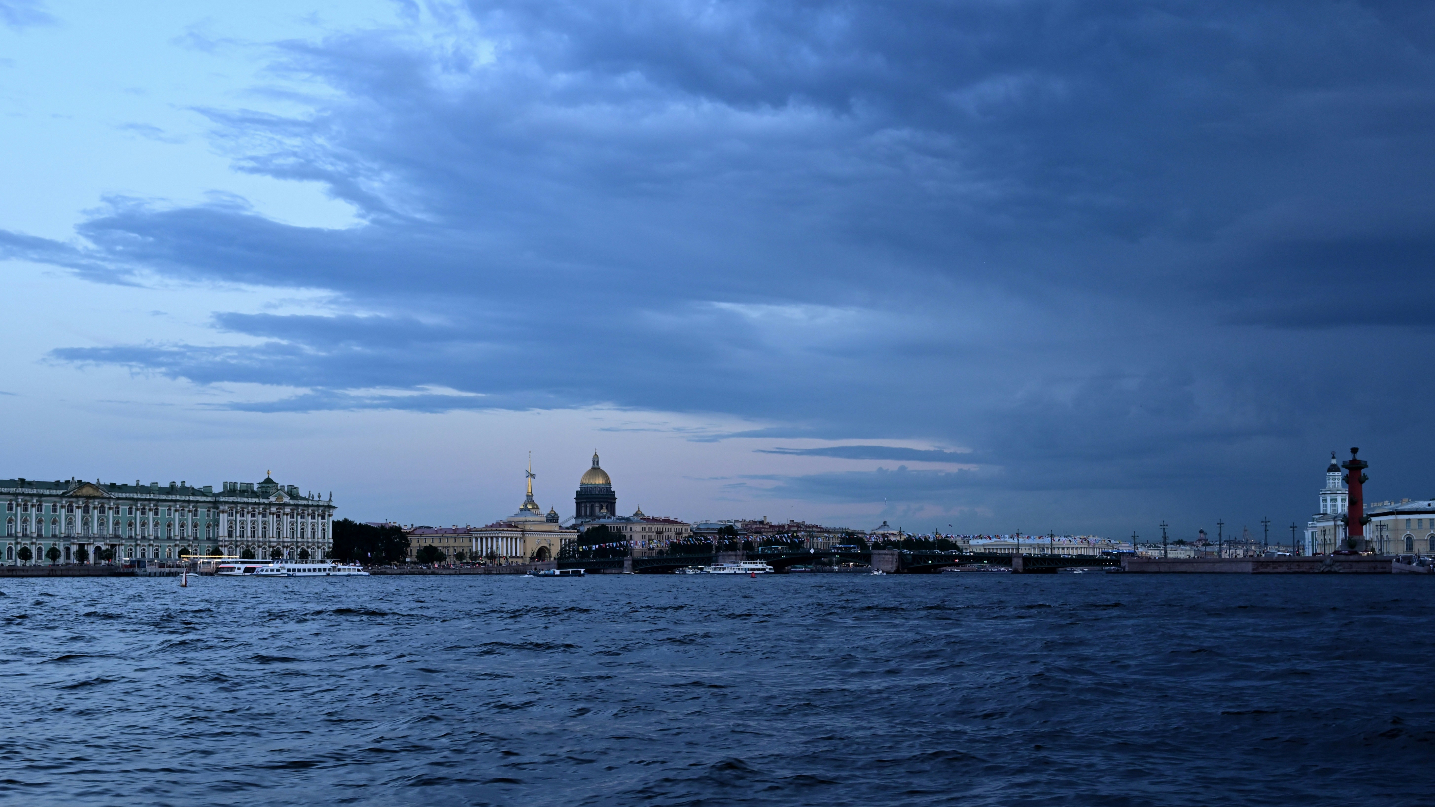Rim of a Quiet Harbor: Evening Lights Across the City