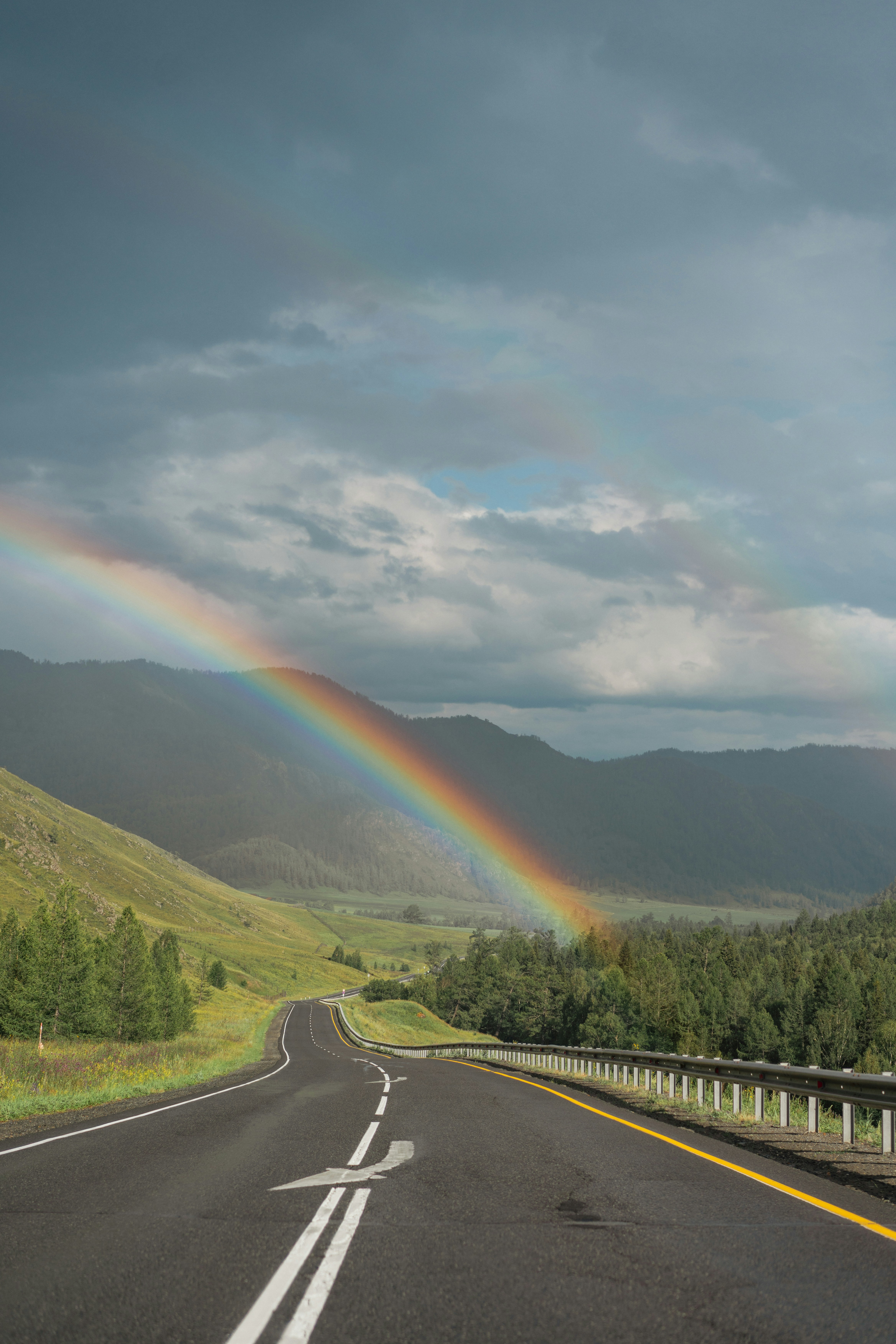 Rainbow Arc Over the Winding Mountain Road