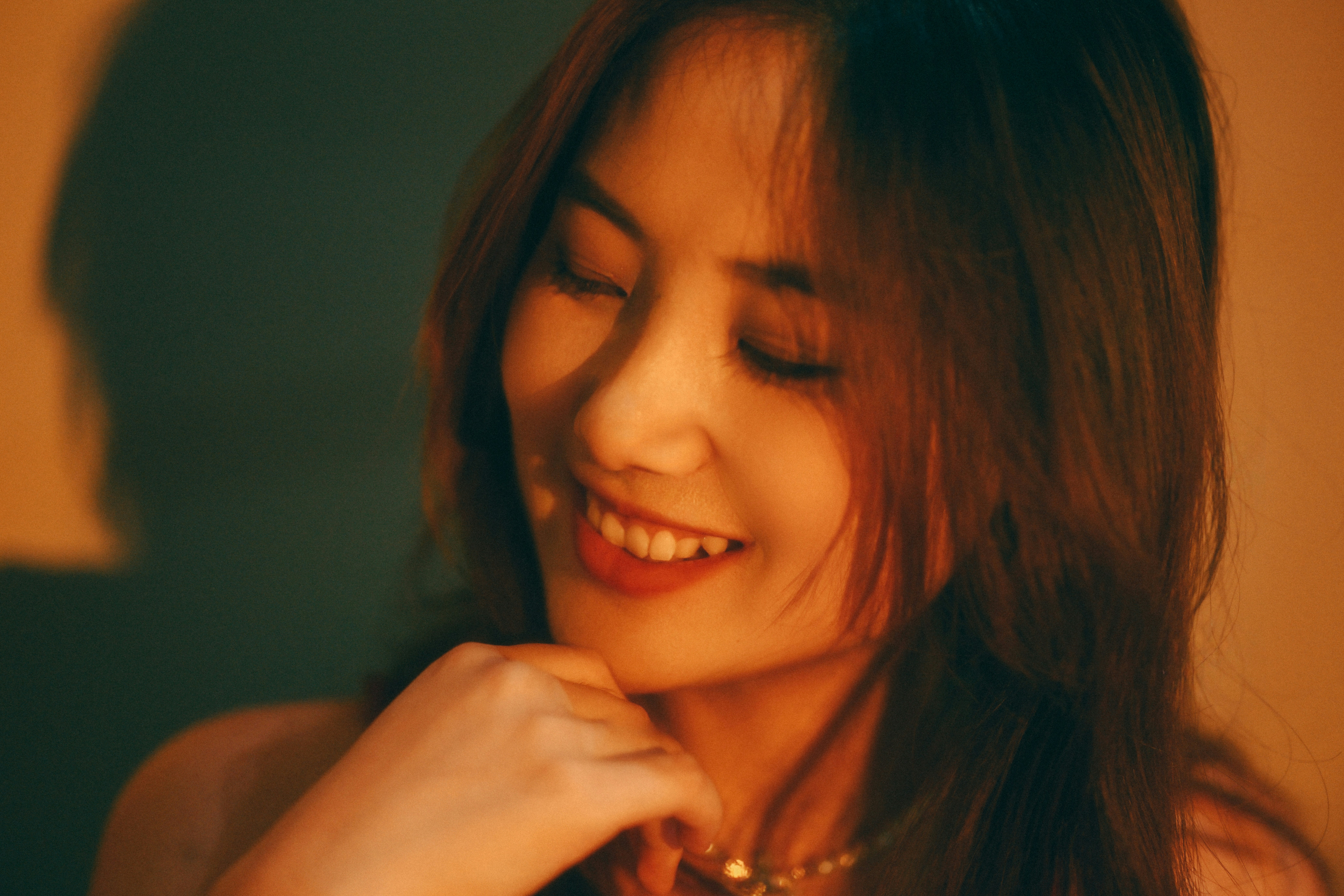 Warm Glow, Soft Smile: A Quiet Portrait