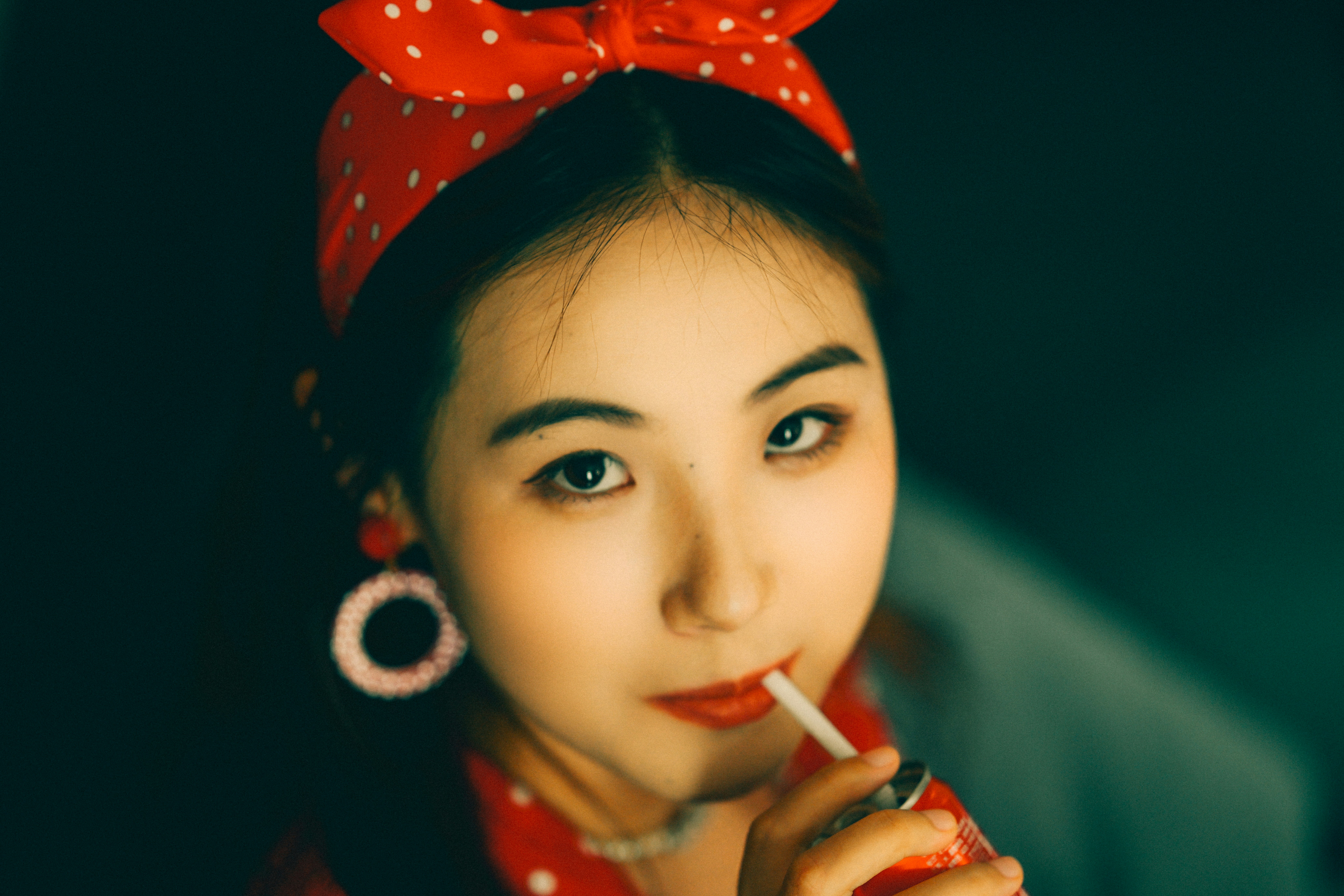 Scarlet Glance: A Soft Moment Under Velvet Shadows