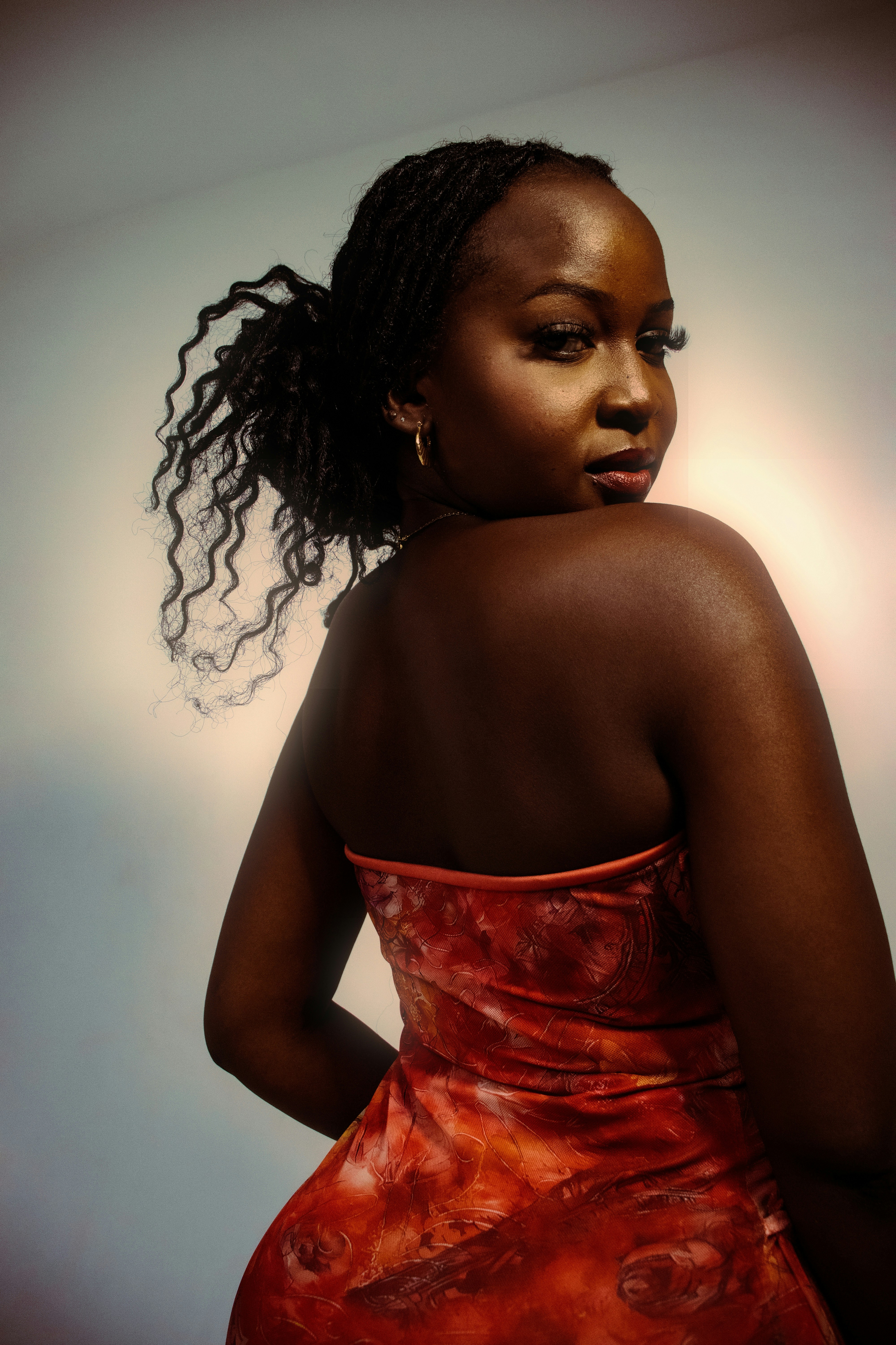 Backlit Confidence: A Portrait in Warm Silhouettes
