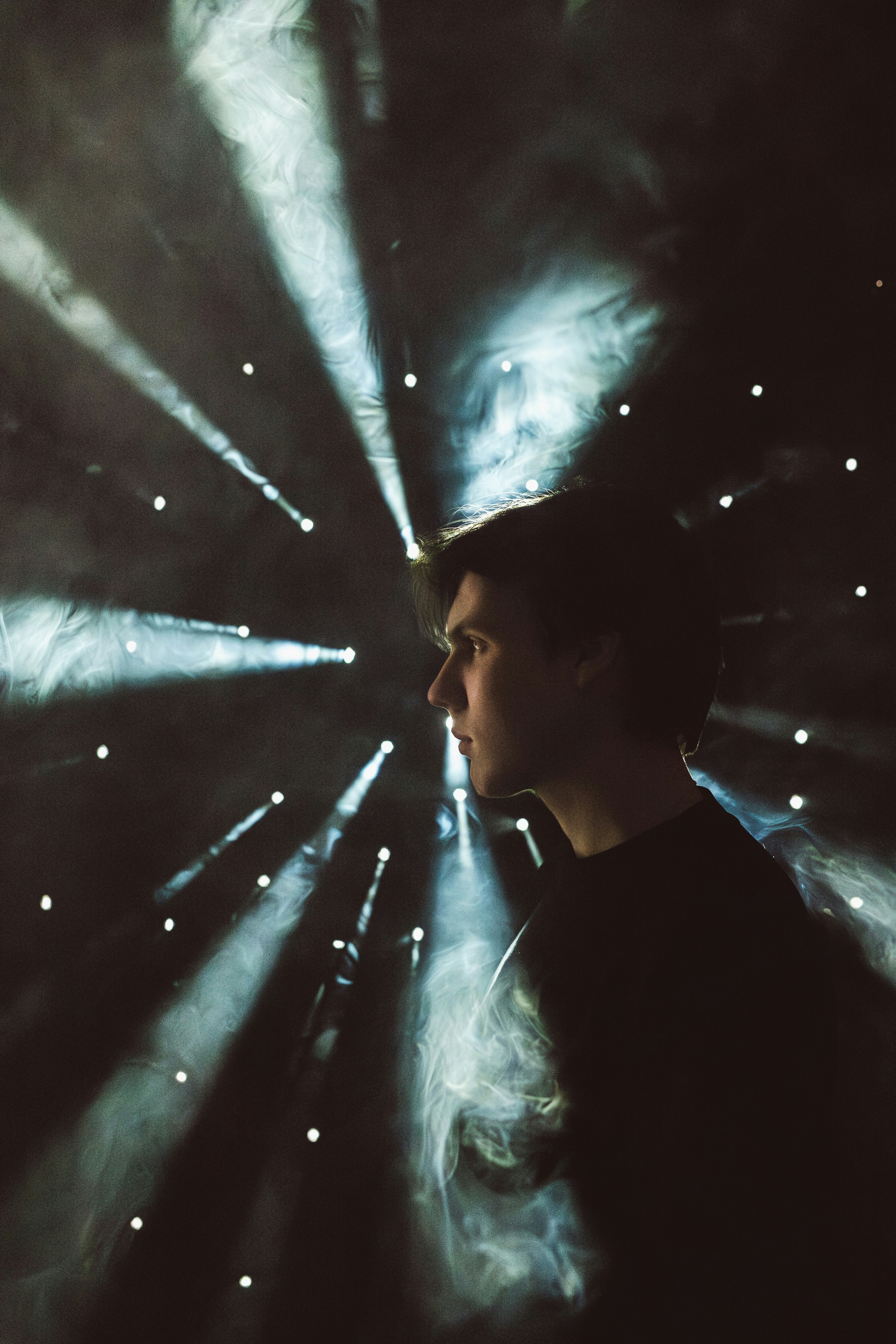 Profile in the Spotlight: A silhouette against a cosmic spray of light