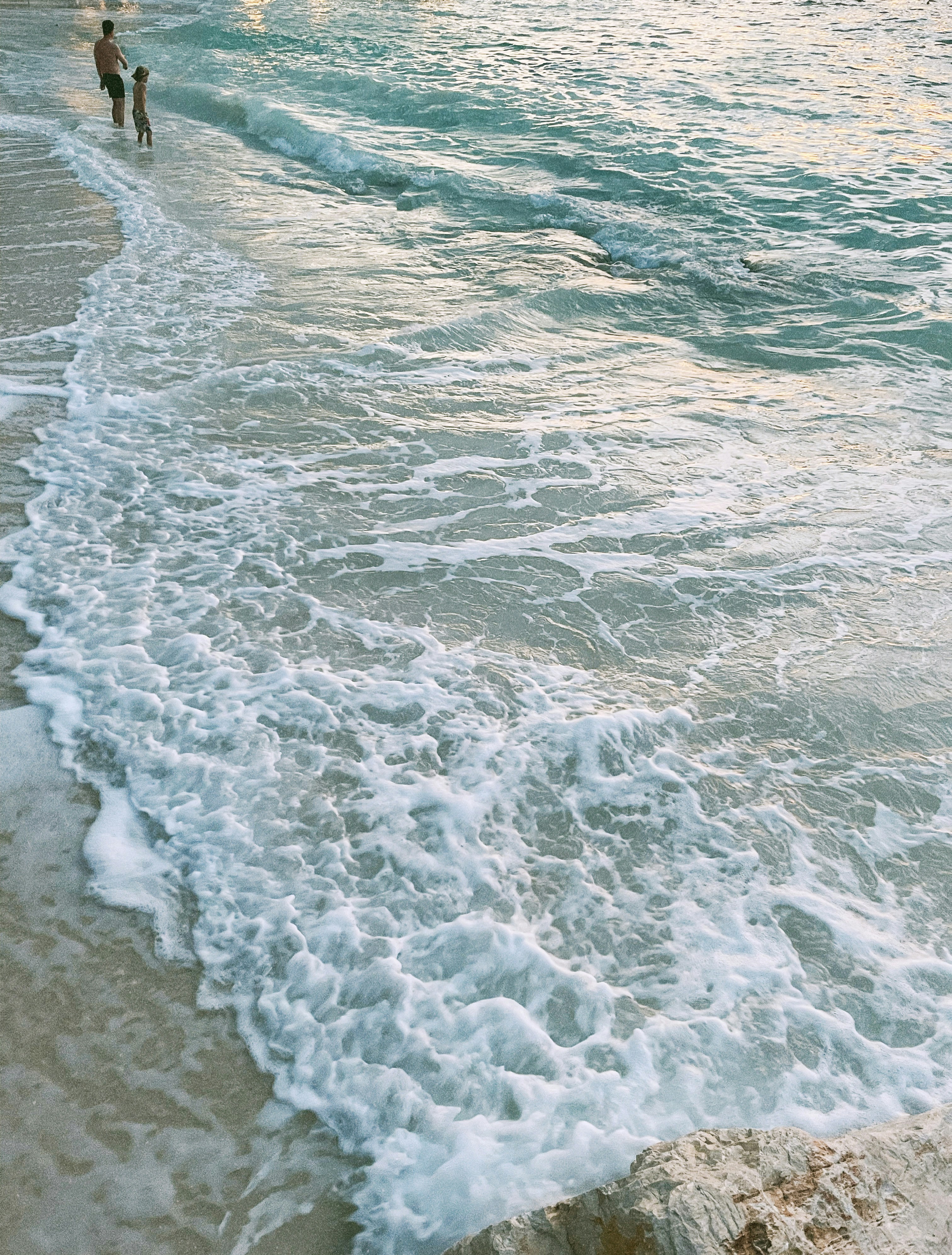 Shoreline Whispers: Gentle Waves at Dawn