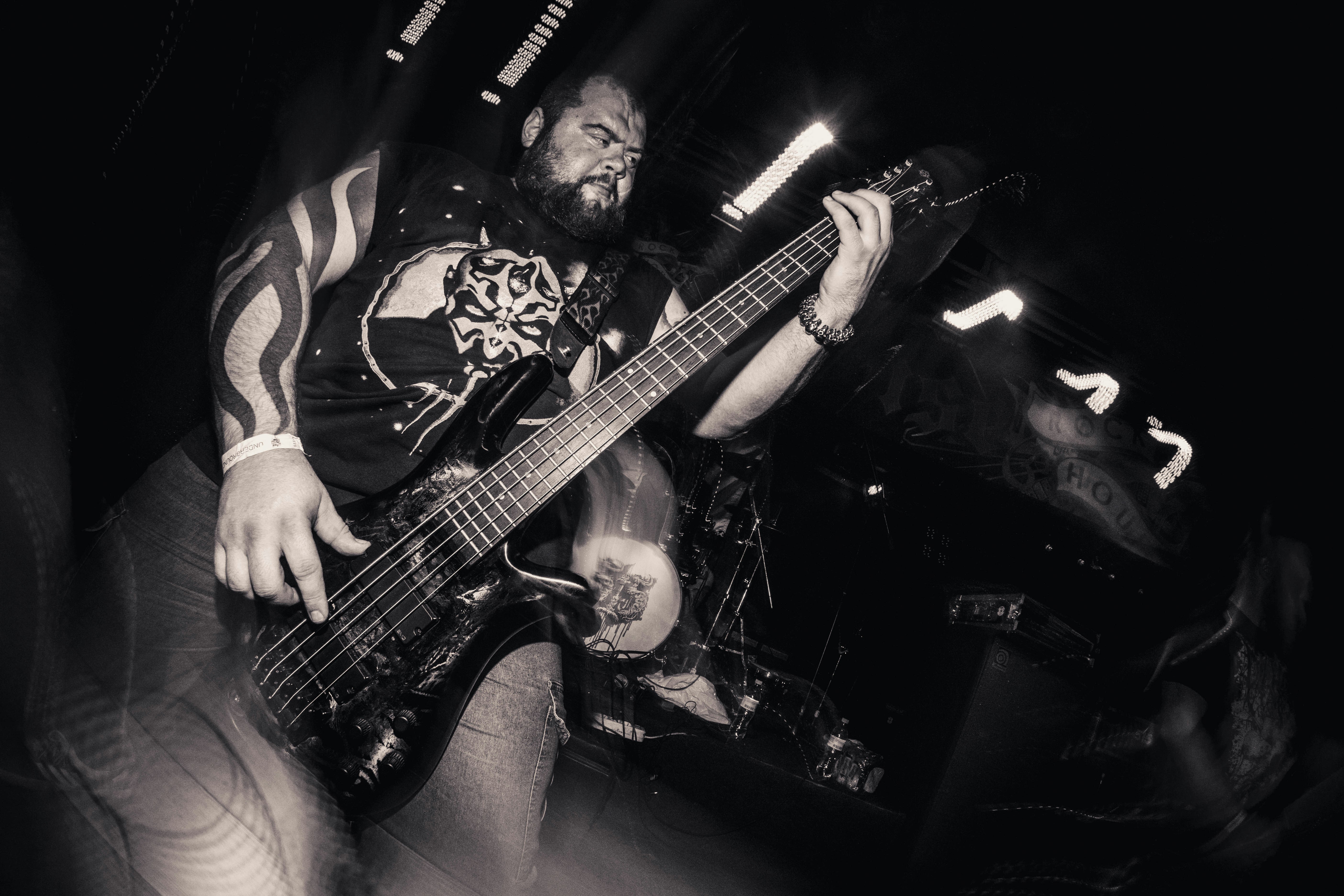 Riff in the Dark: A bassist's Grit and Swagger