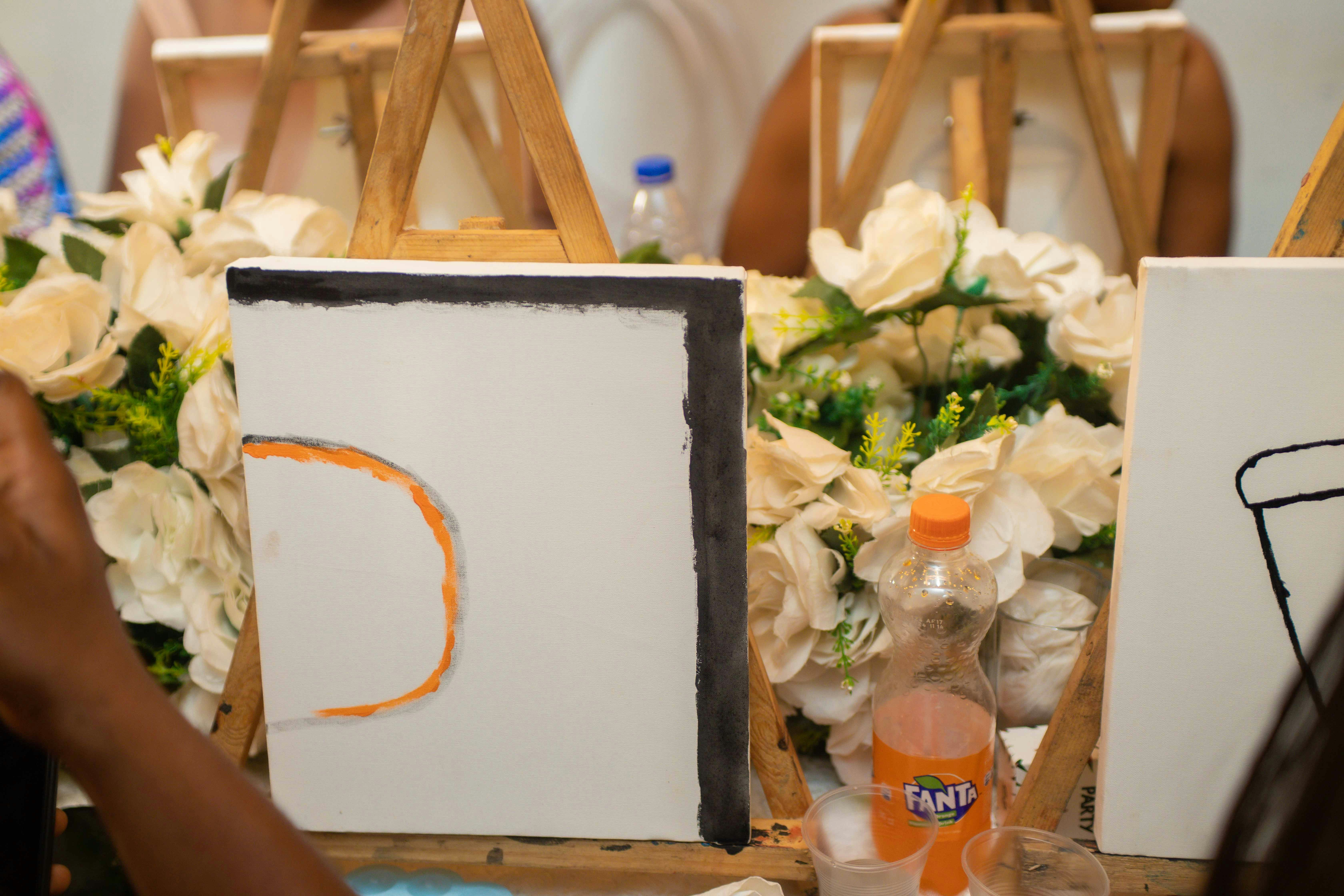 Brushstrokes and Bottles: A Quiet Still Life at the Easel