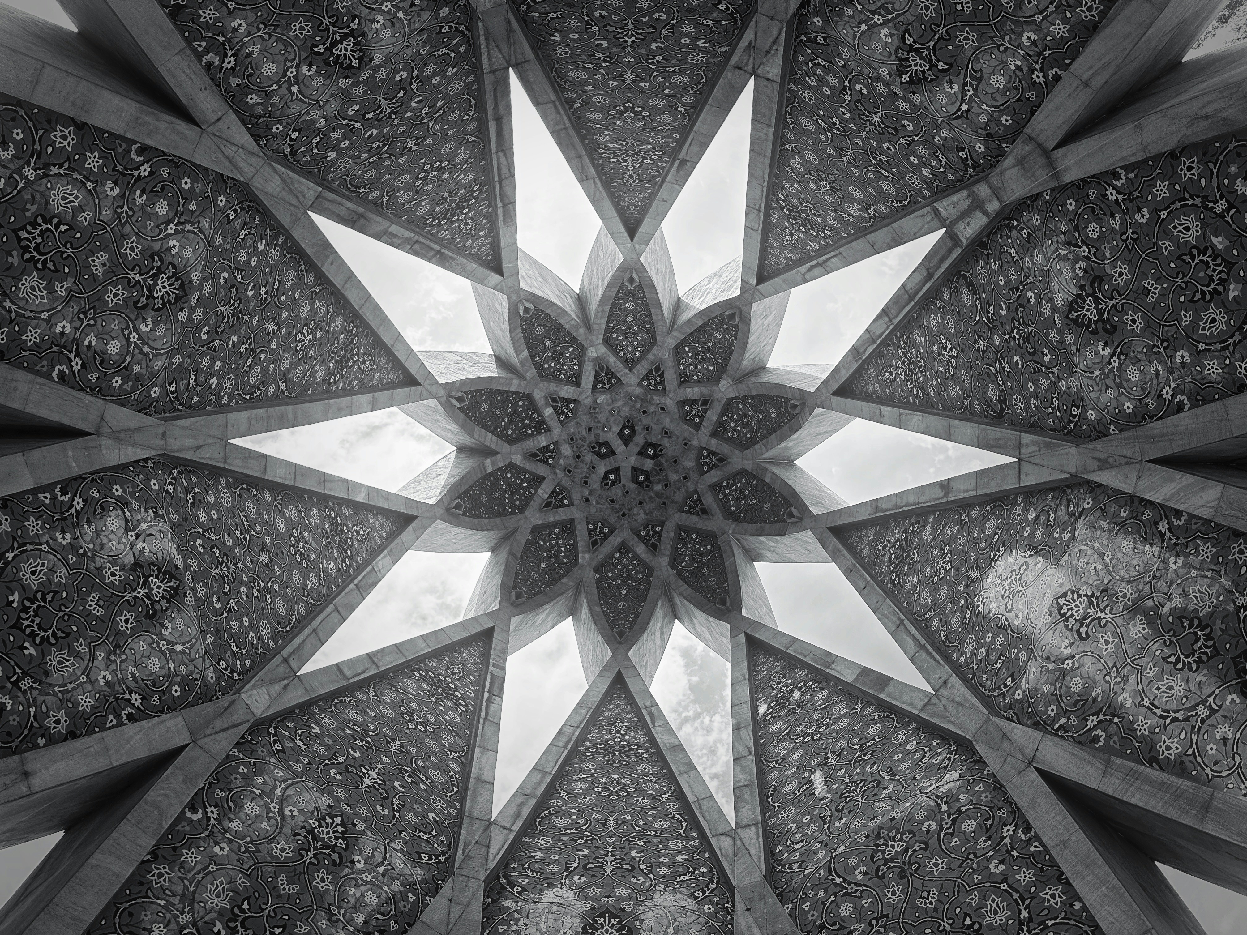 Symmetrical Starburst Ceiling: An Architectural Moment in Light and Pattern