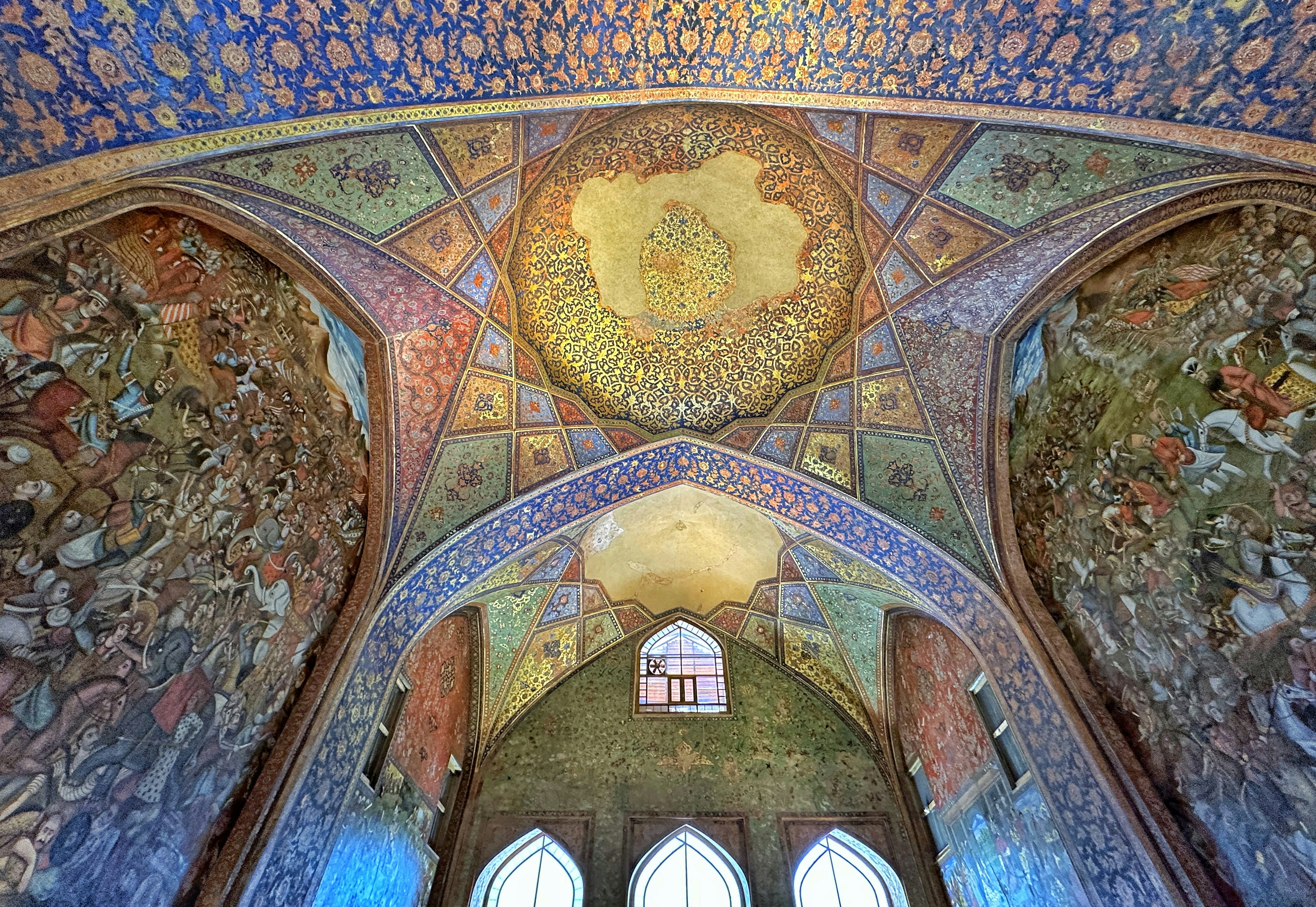 Painted Vaults: A Symmetrical Tapestry of Color and Light
