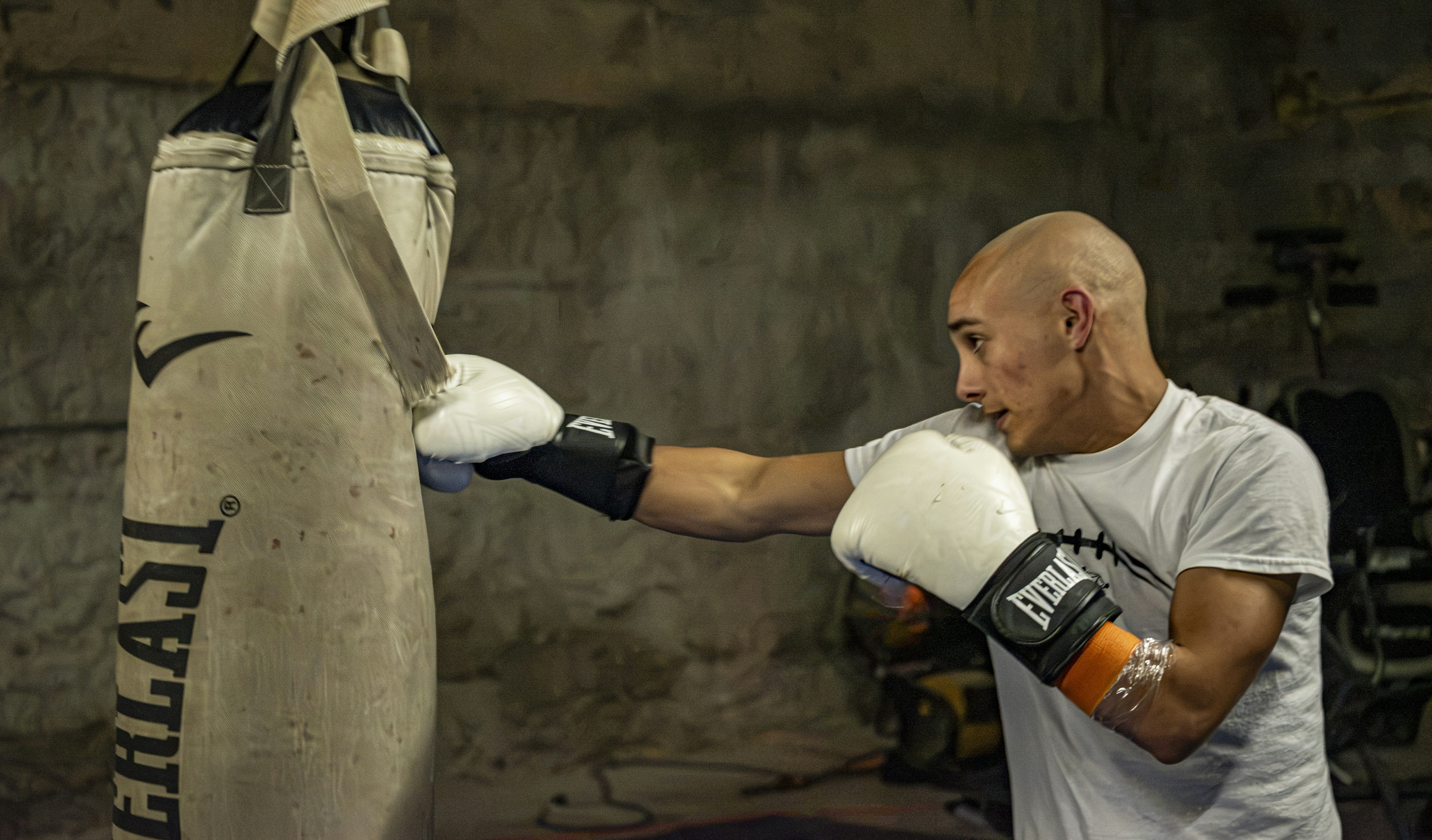 Gloved Focus: A Boxer’s Precision in the Ring