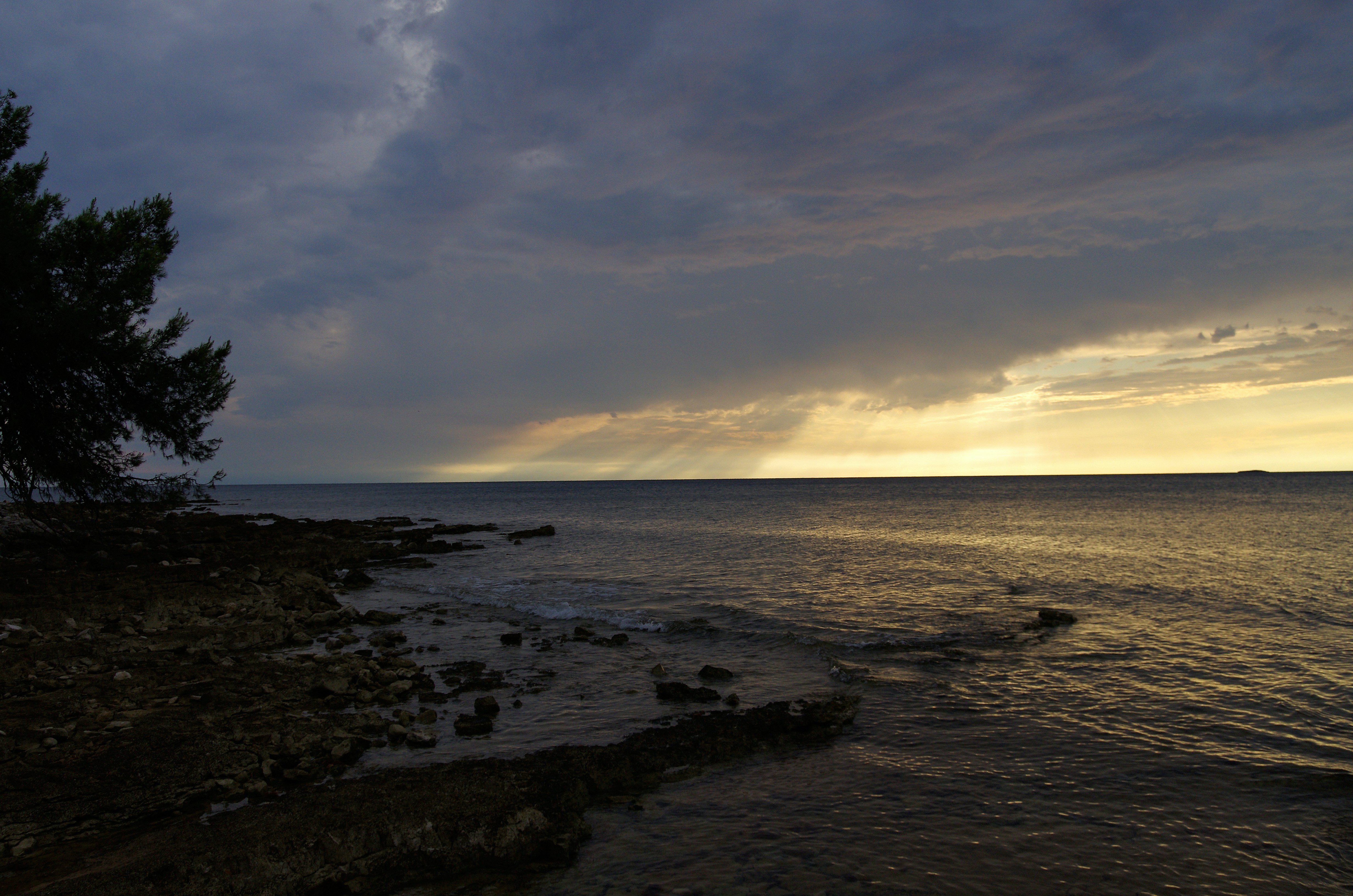 Horizon Flame over a Quiet Tide