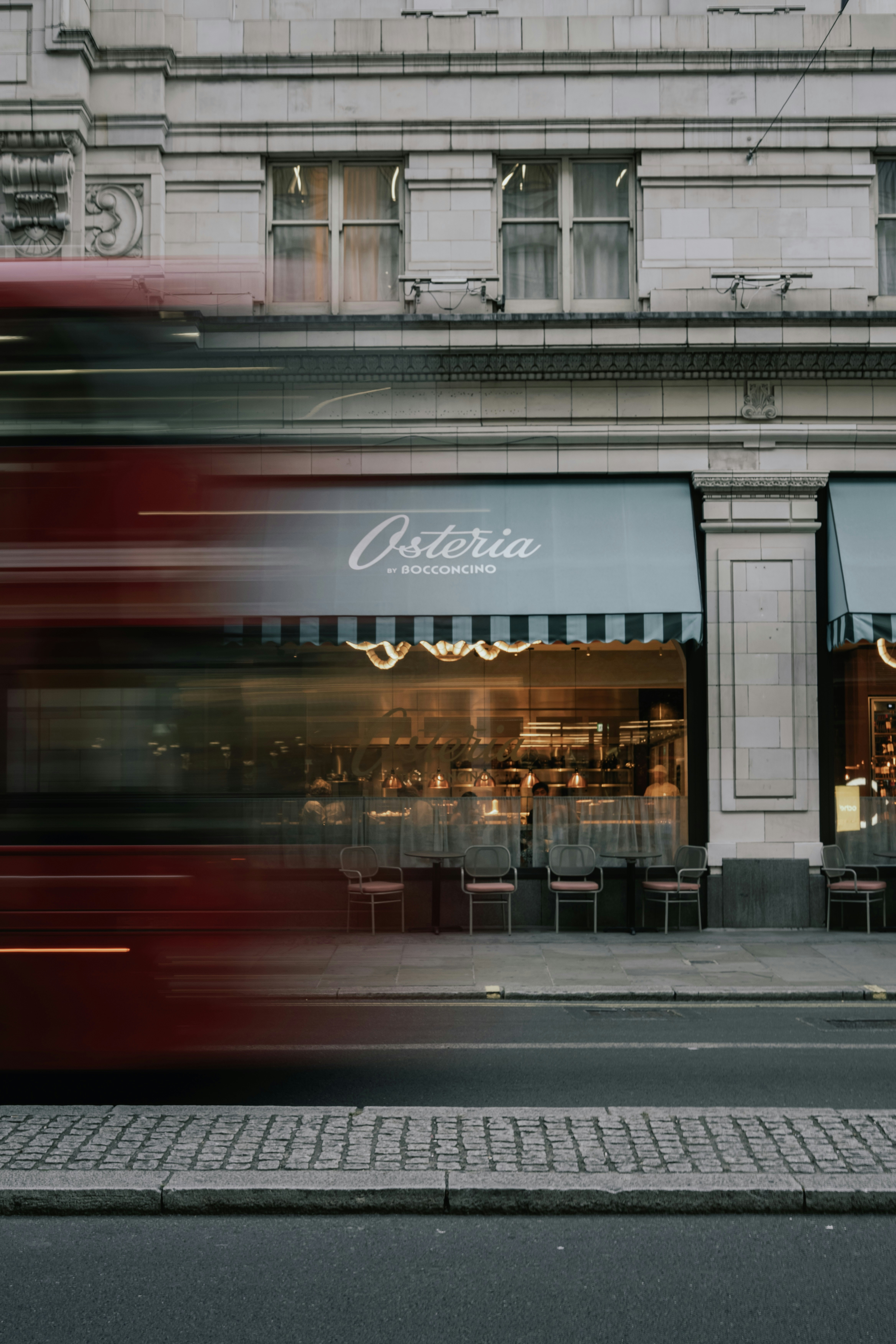 A Timed Glimpse of Osteria Through a Red Blur