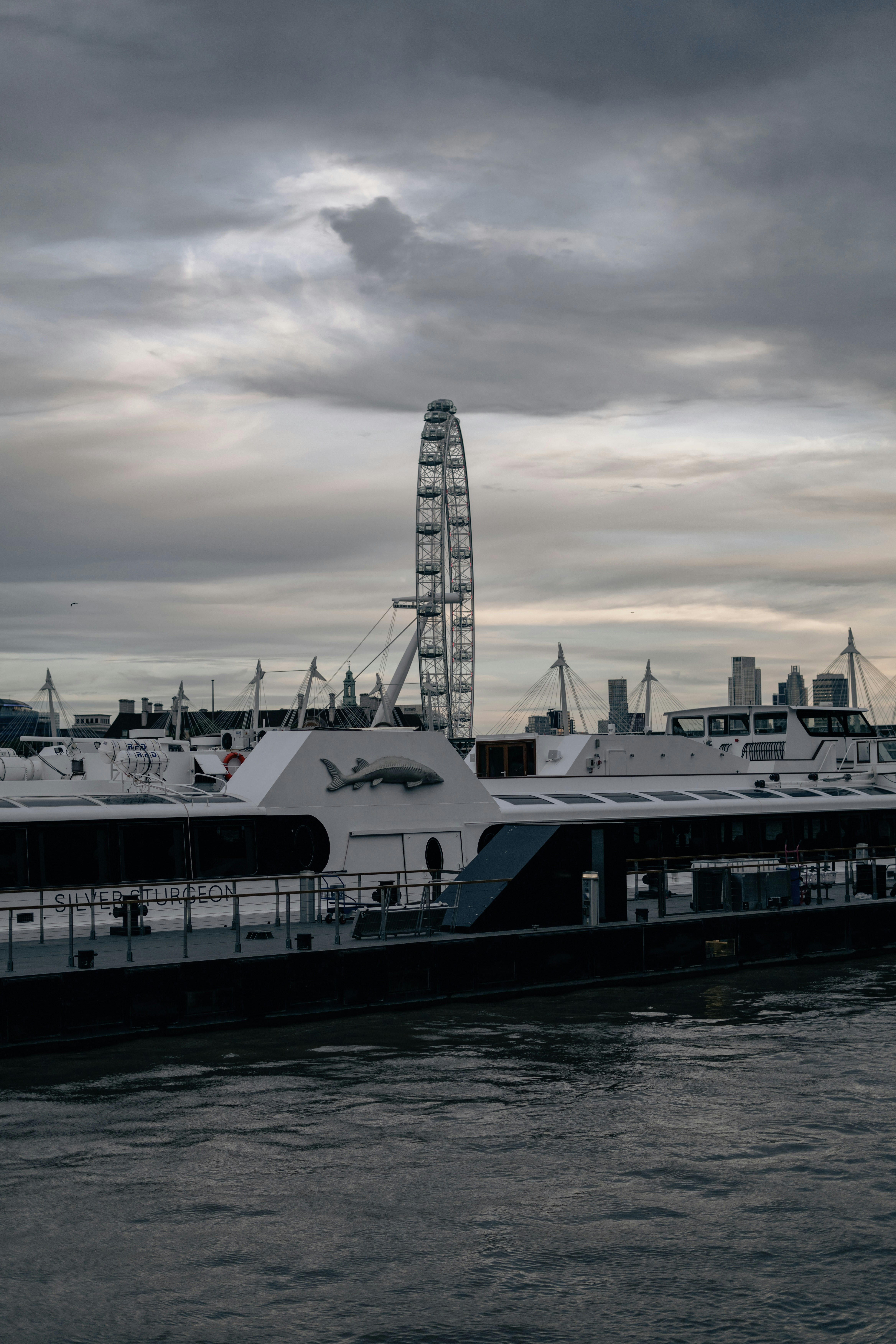 Riverside Marina with the London Eye Silhouette at Dusk
