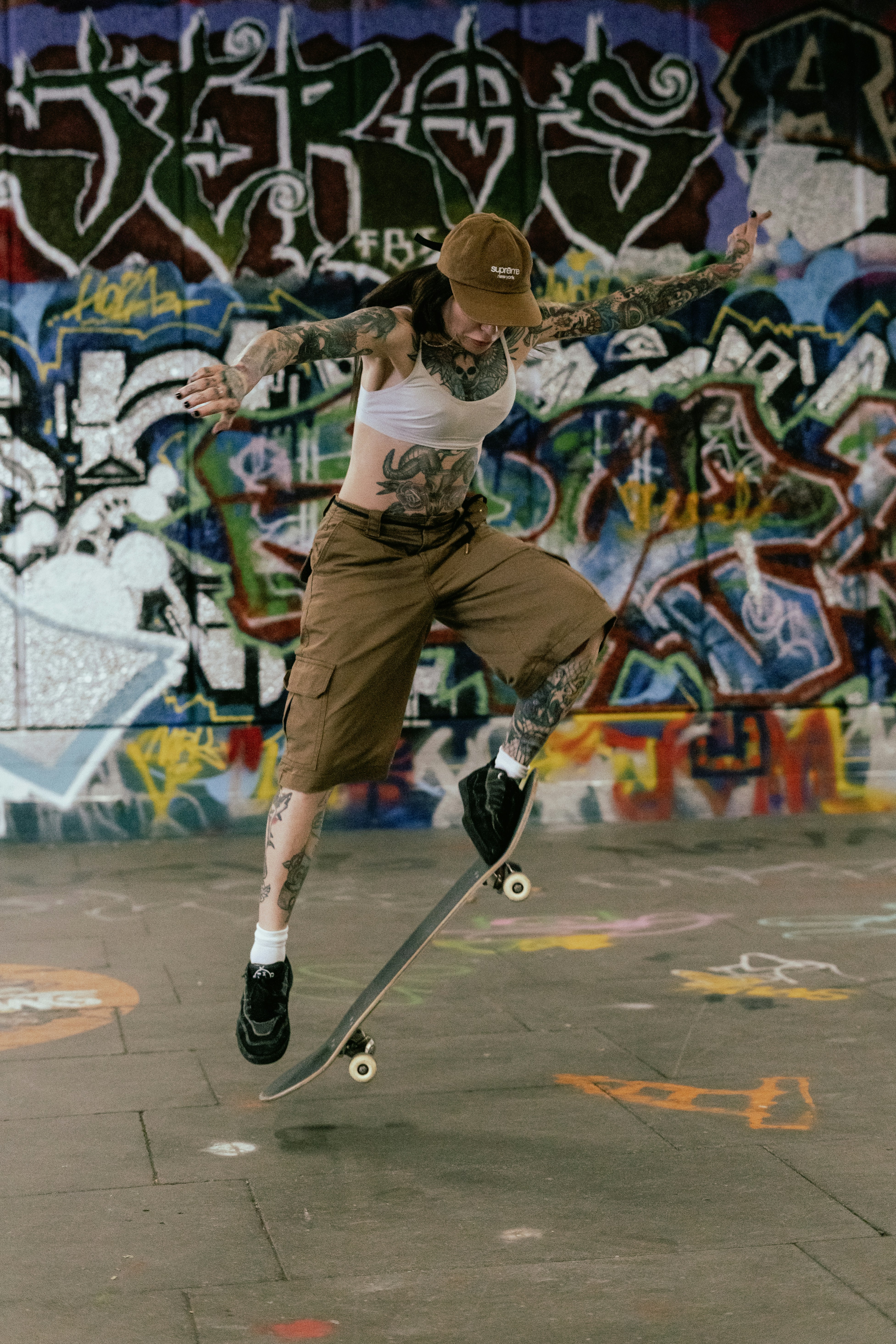 Kickflip in Color: Tattooed Athlete Sparks the Concrete Canvas